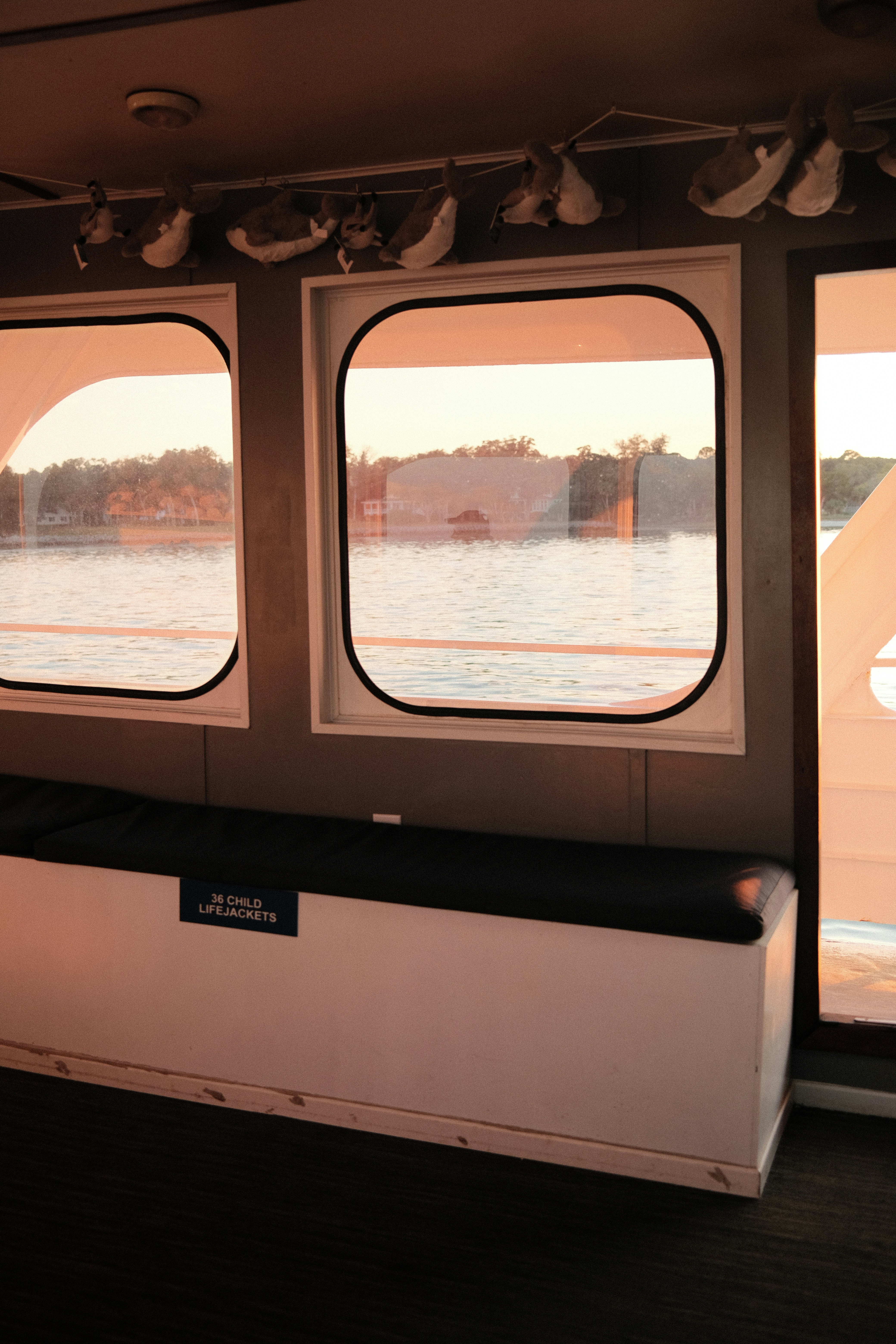 A view of a body of water from inside a boat photo – Free Boat Image on ...