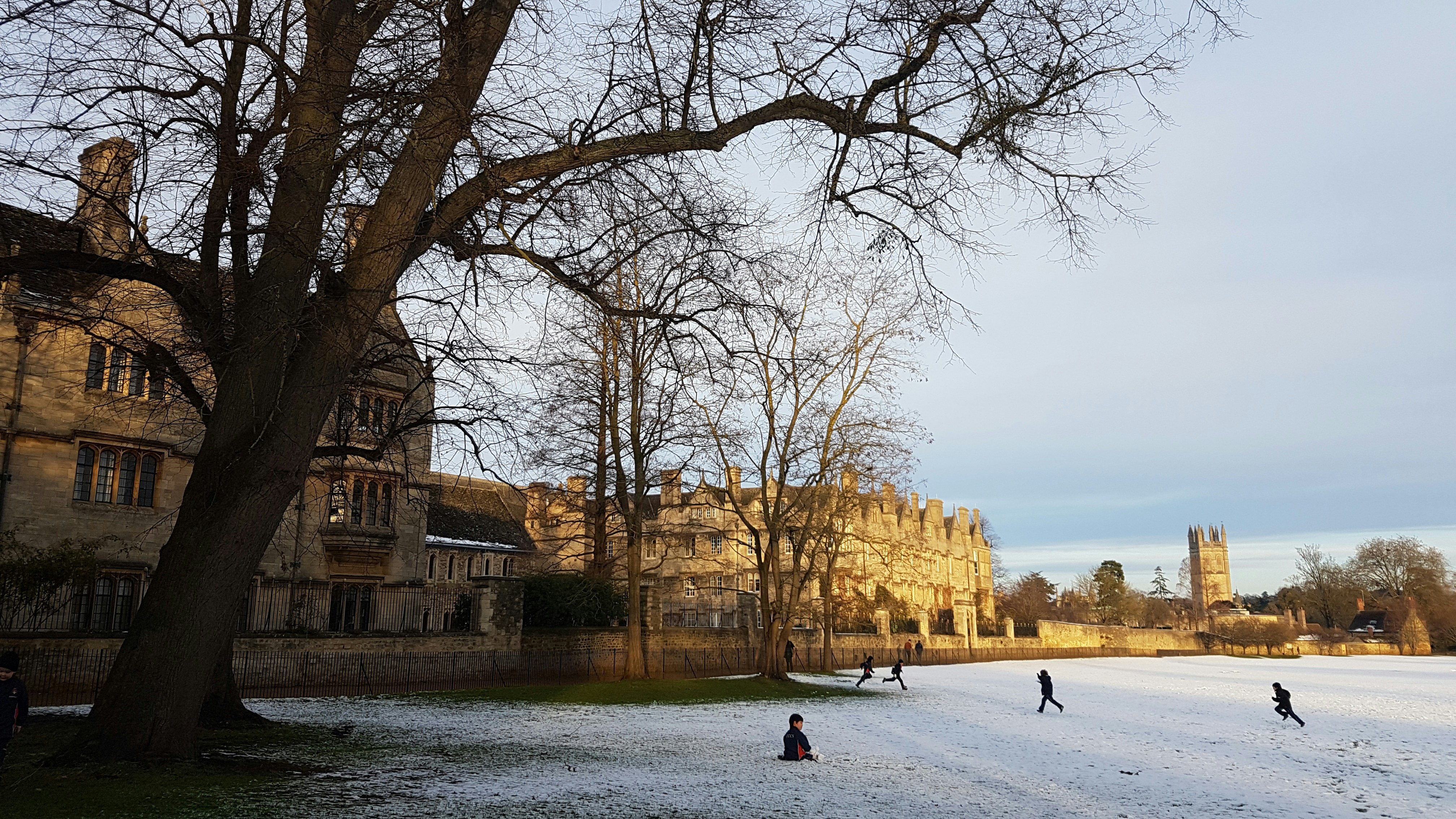 Winter Courtyard at the Citadel: Skaters Across Snow before a Stone Fortress