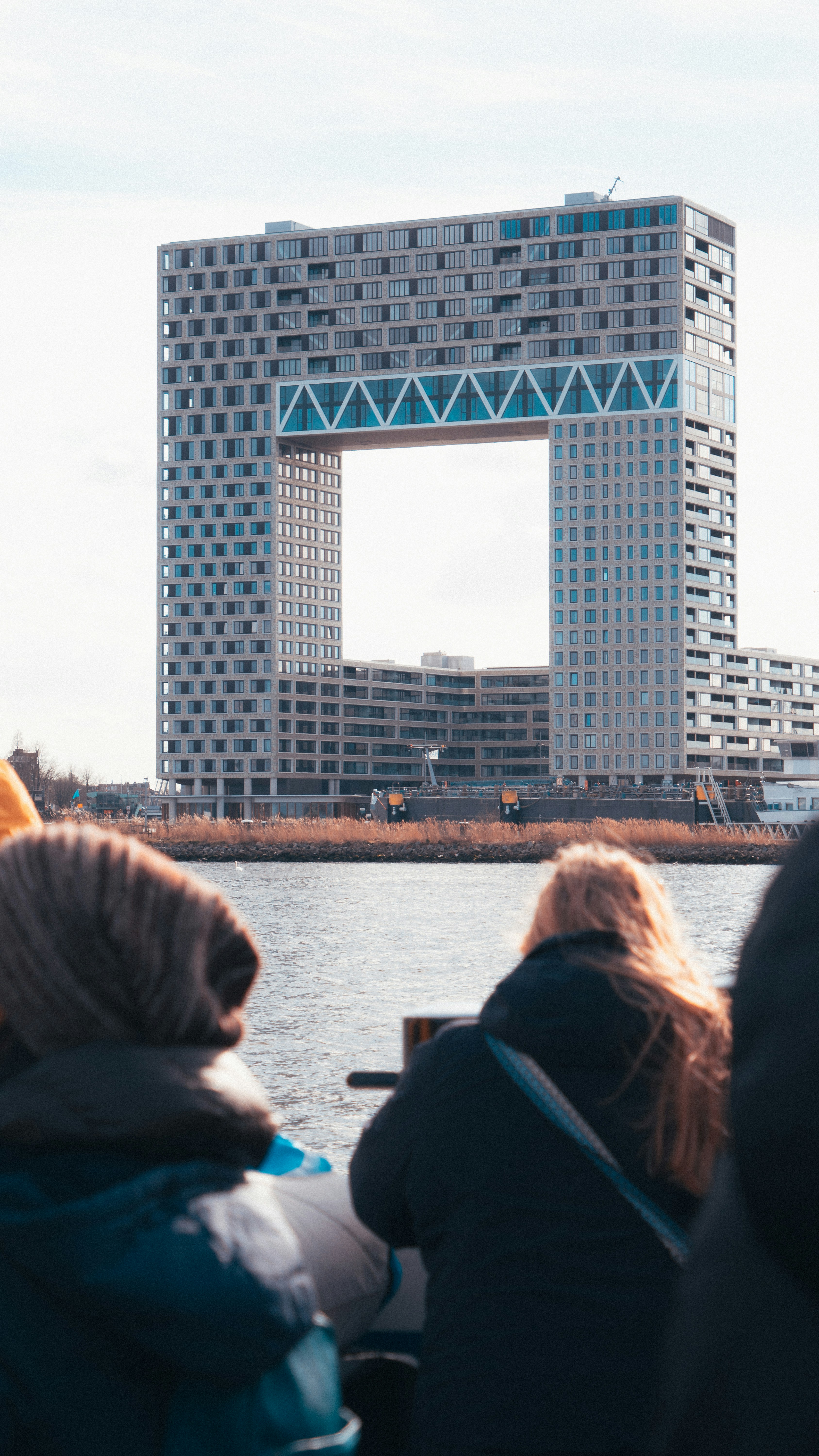 Portside Frame: The Open-Window Tower Framing the River