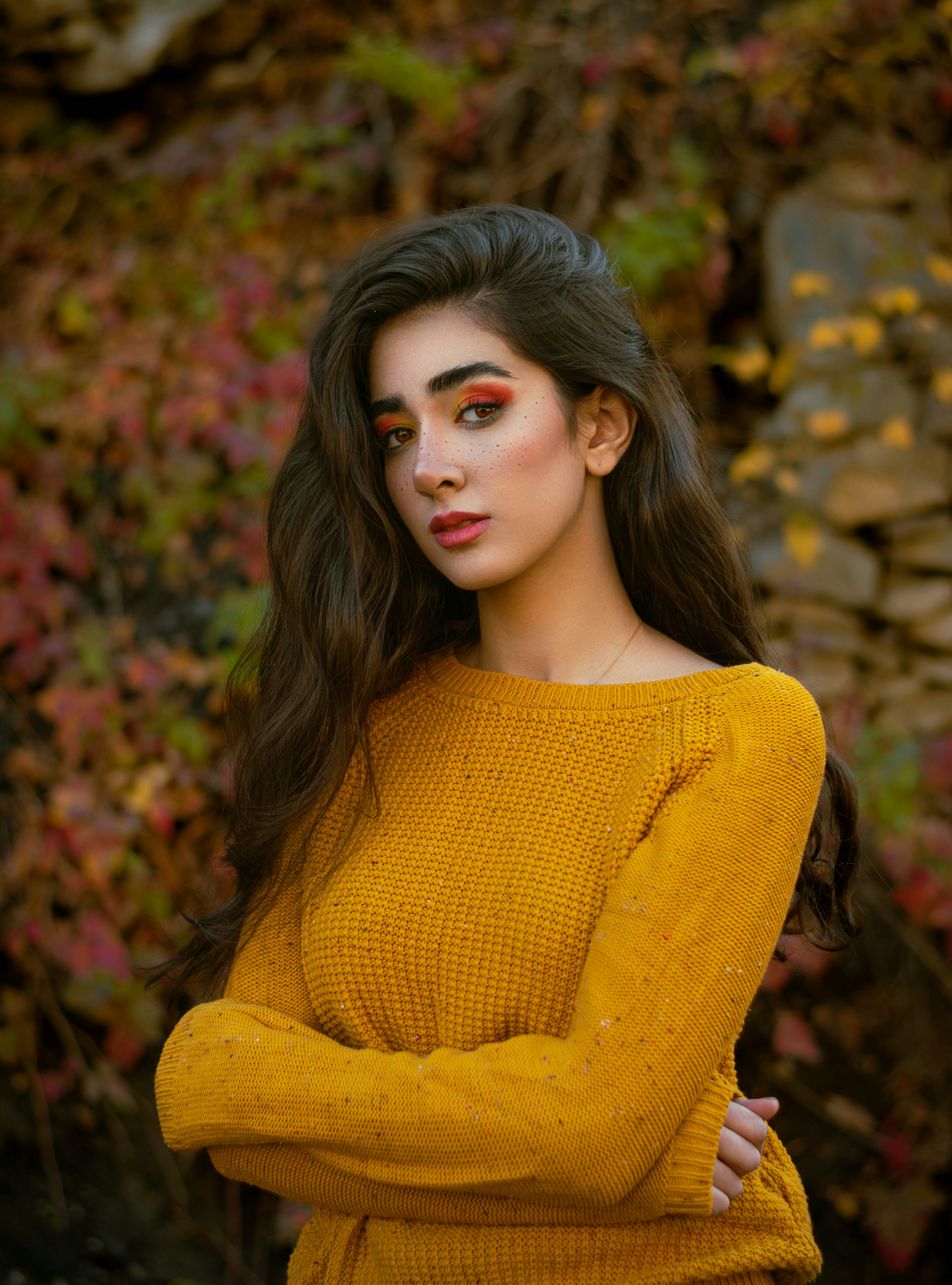 A woman in a yellow sweater posing for a picture photo – Free Wallpaper ...