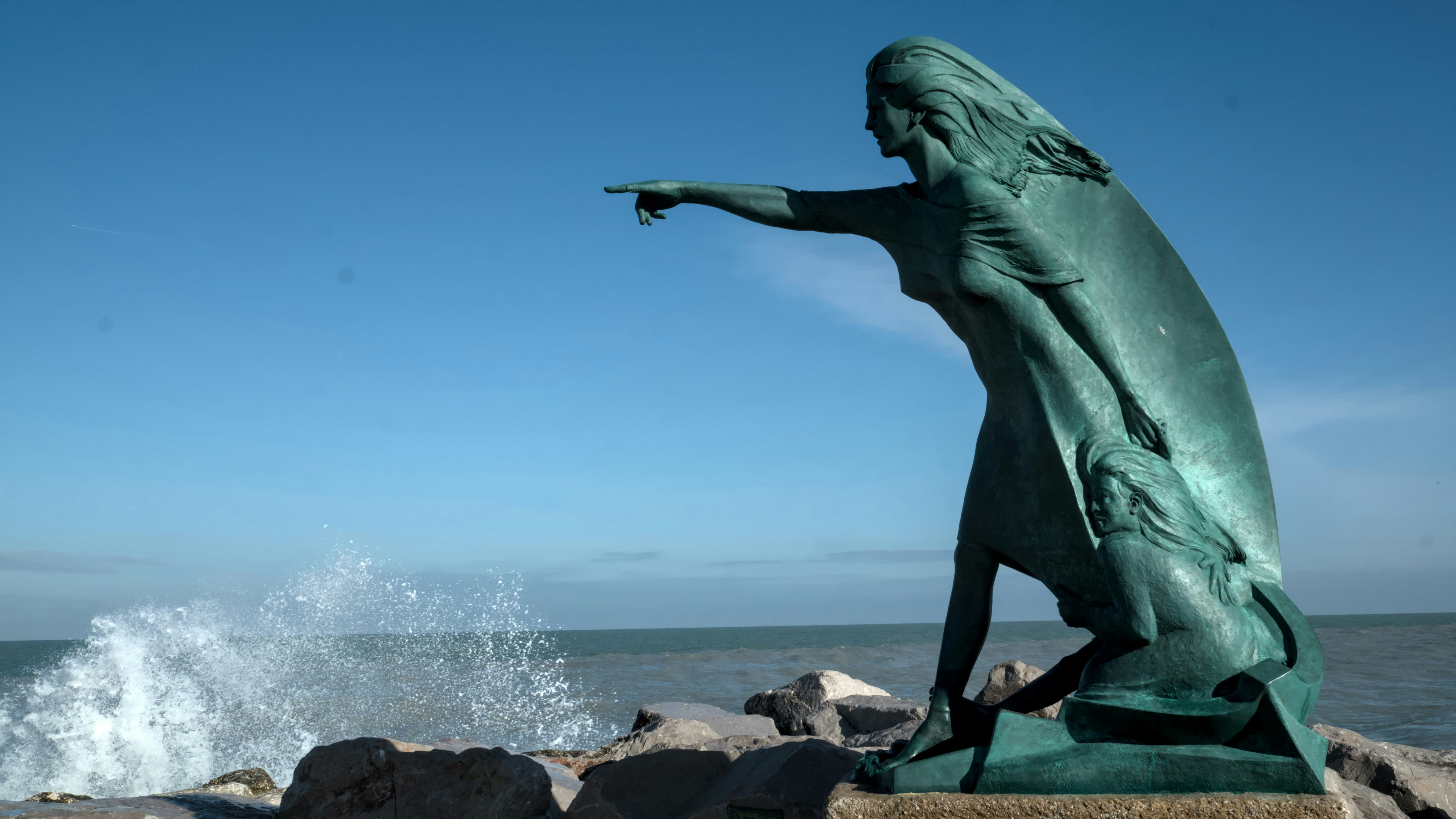 Eternal Vigil: The Watchful Gaze Over Rimini's Waters