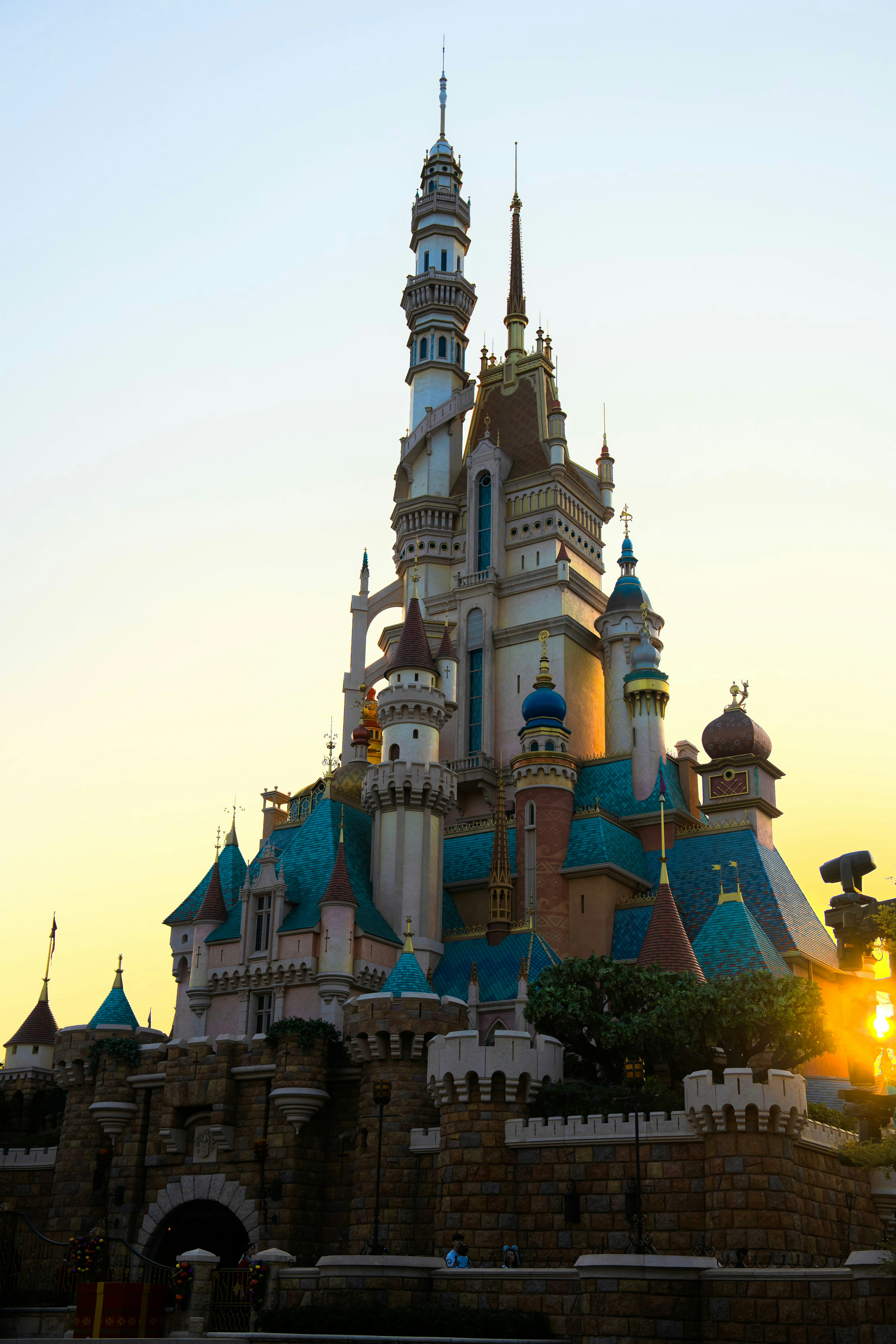 A very tall castle with a clock on it's side photo – Free 香港特别行政区 Image ...