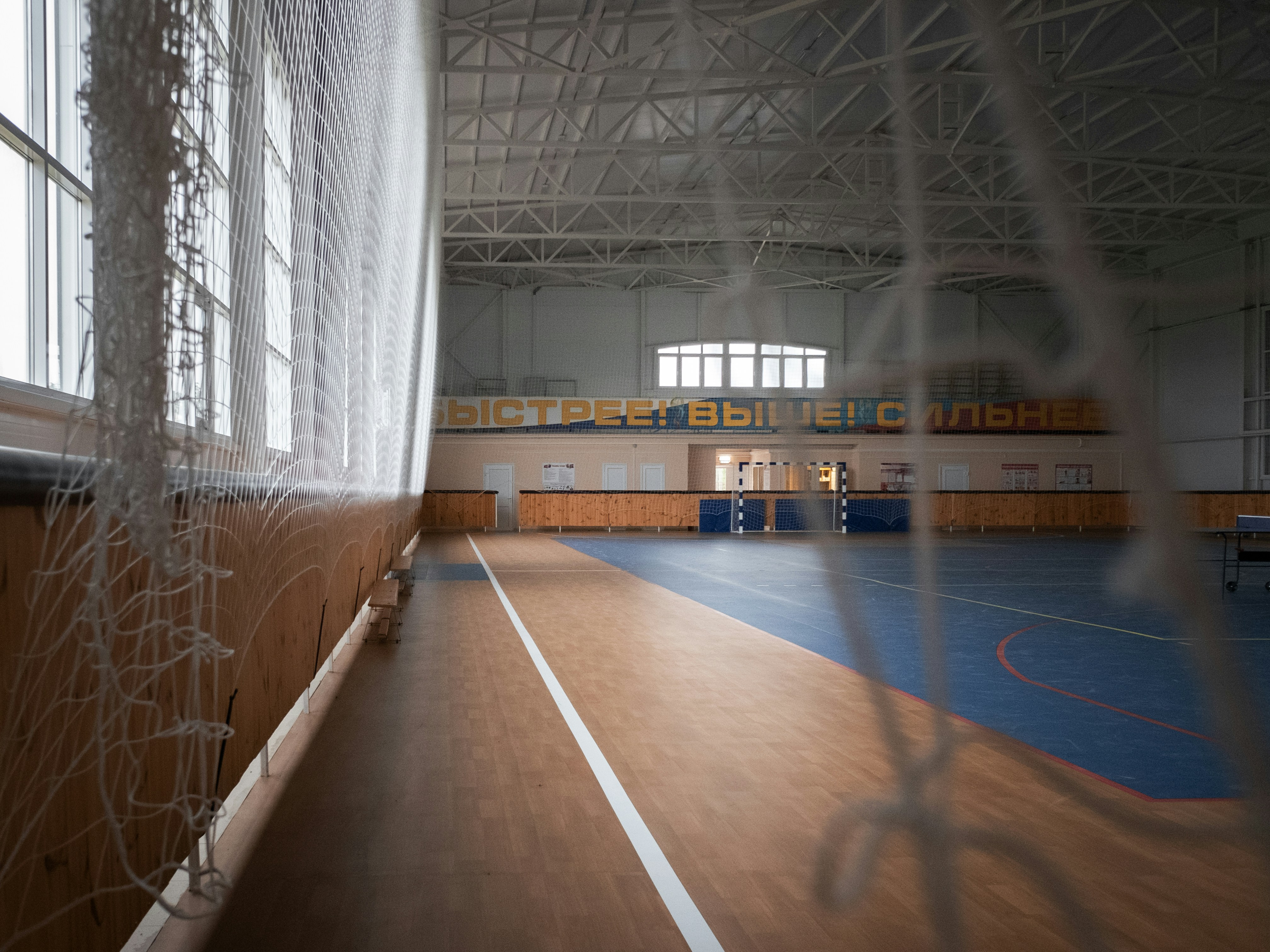 A large indoor gym with hard wood flooring photo – Free Poltavskaya ...