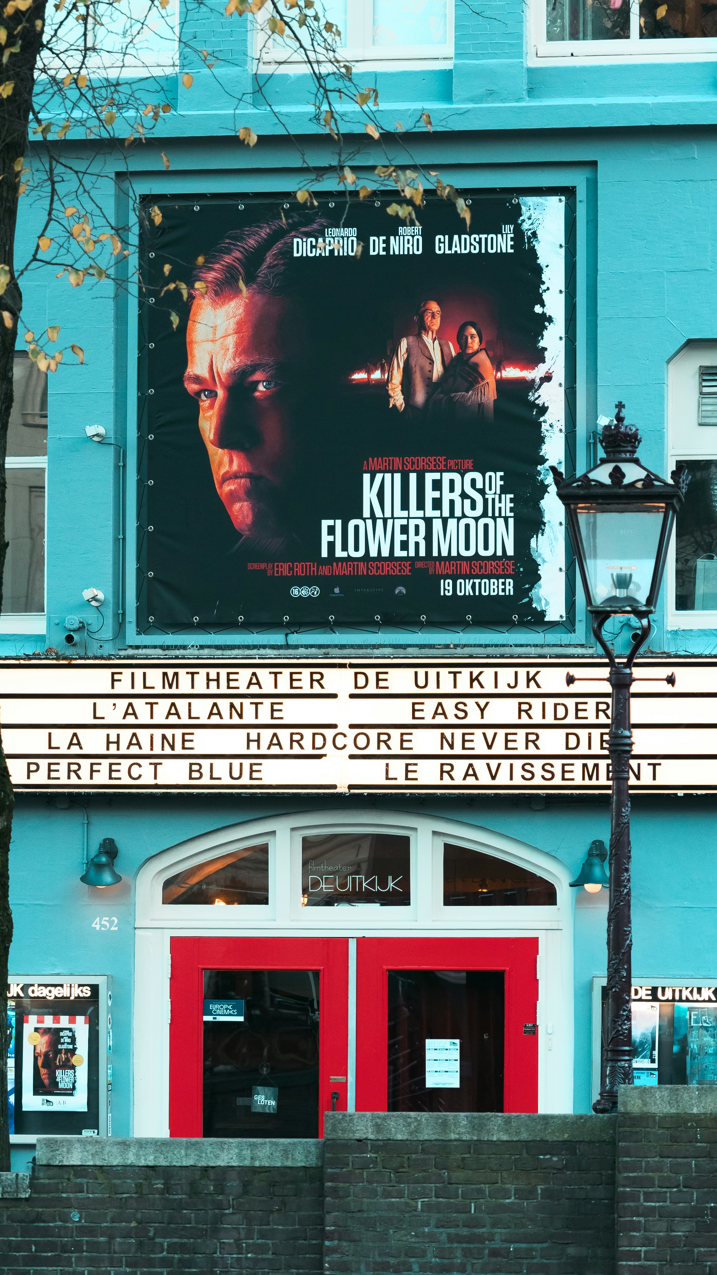 A movie poster on the side of a building photo – Free Amsterdam Image ...