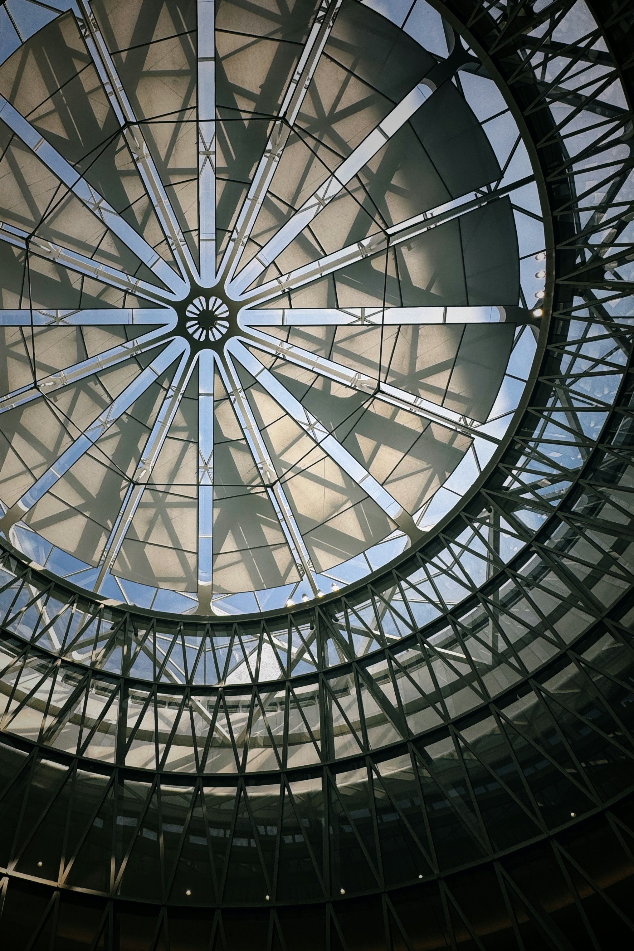A circular glass ceiling in a building photo – Free Building Image on ...