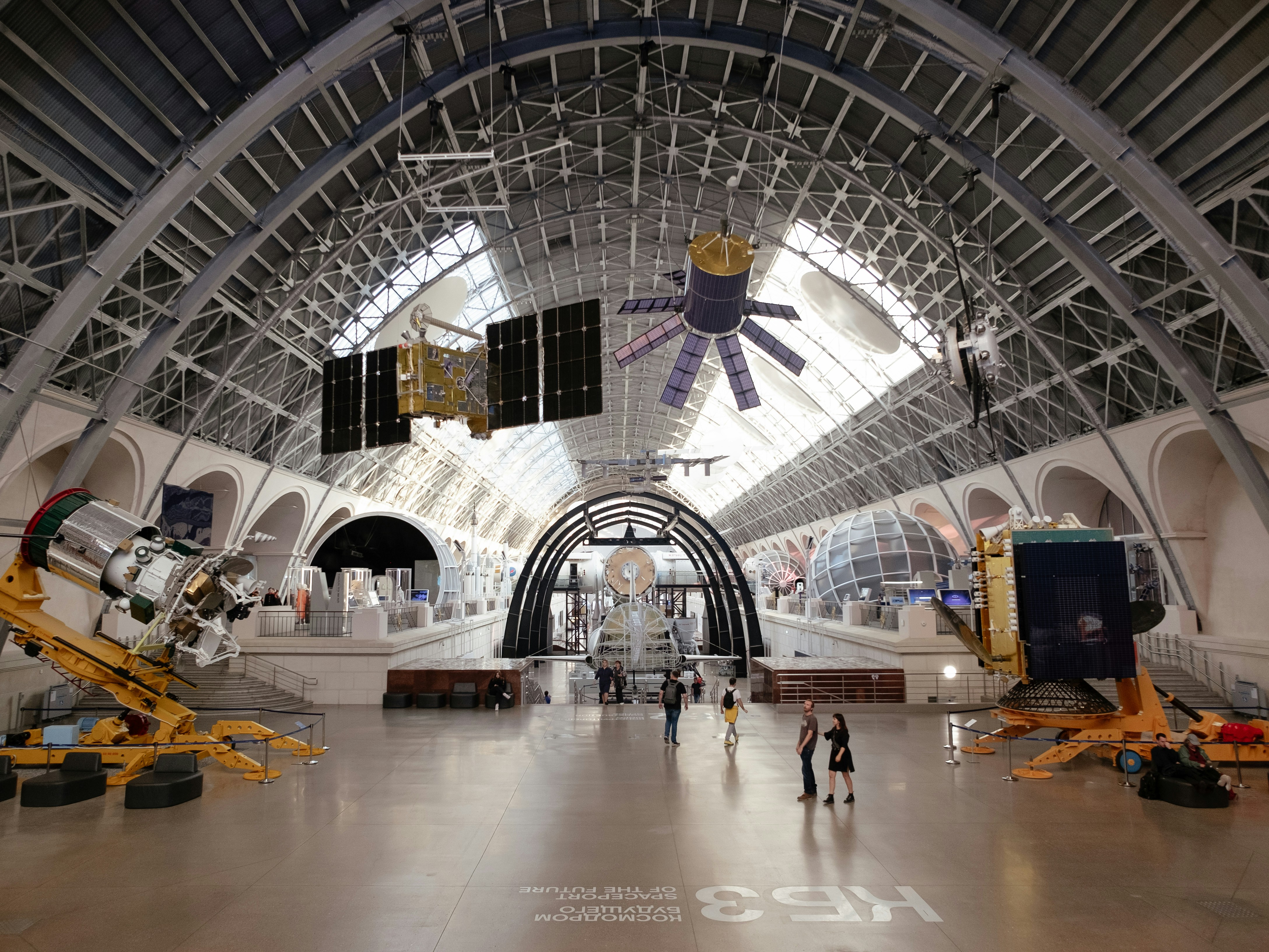 A large building with a bunch of people inside of it photo – Free Vdnh ...