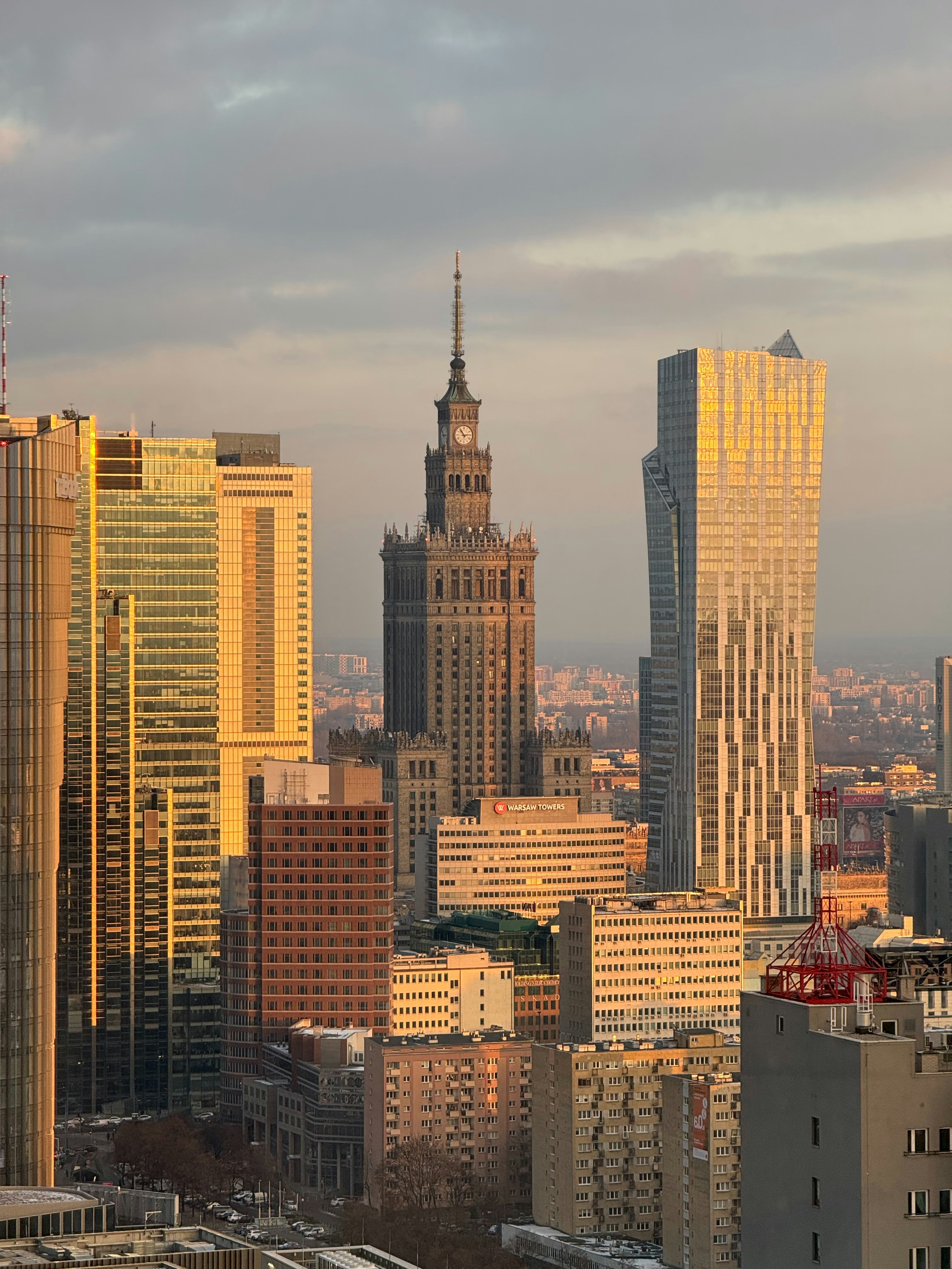 Golden Hour Crown: Clock Tower Among Glass Giants