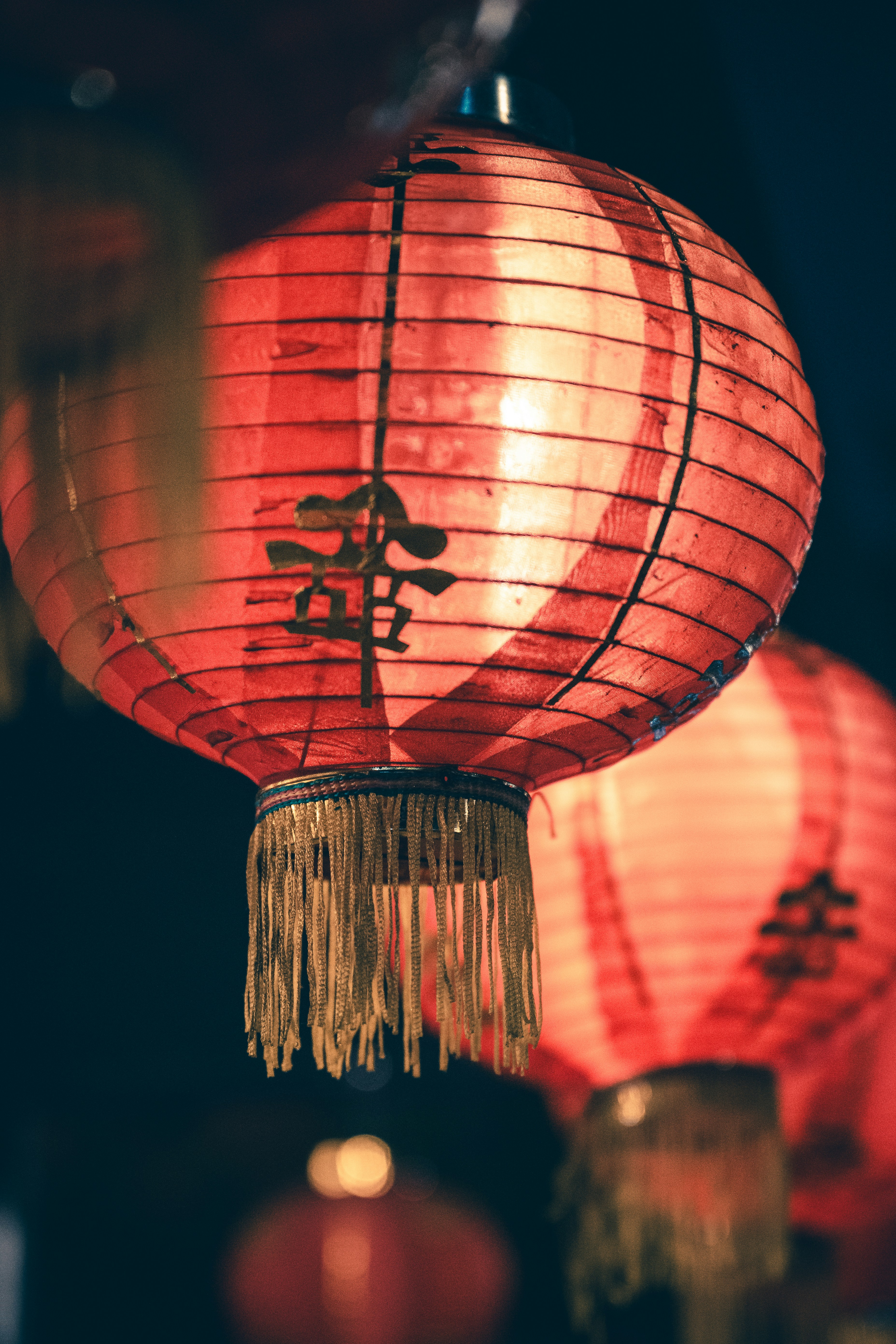 A group of red lanterns with chinese writing on them photo – Free ...