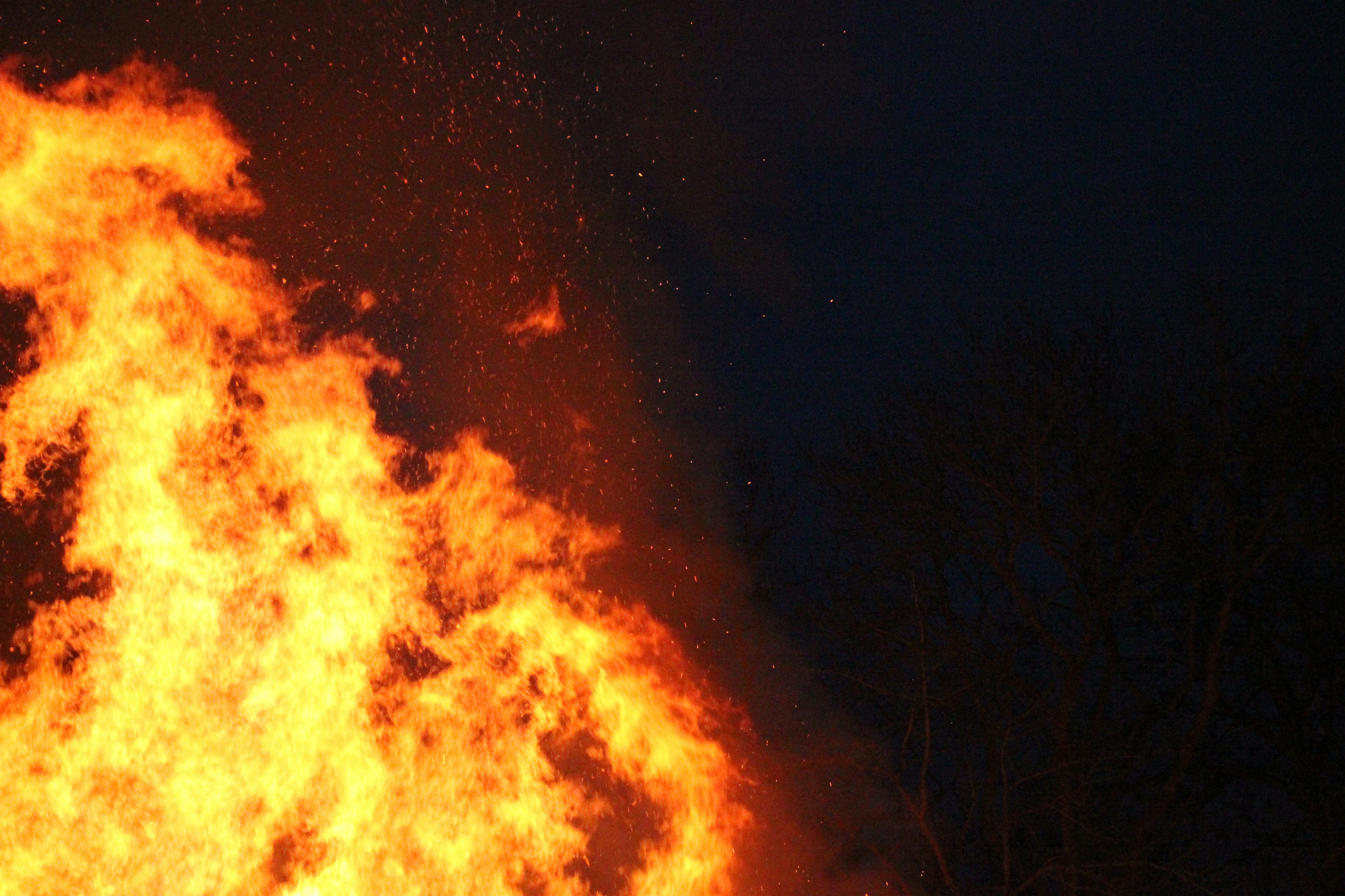 A fire hydrant spewing out flames at night photo – Free Fire Image on ...
