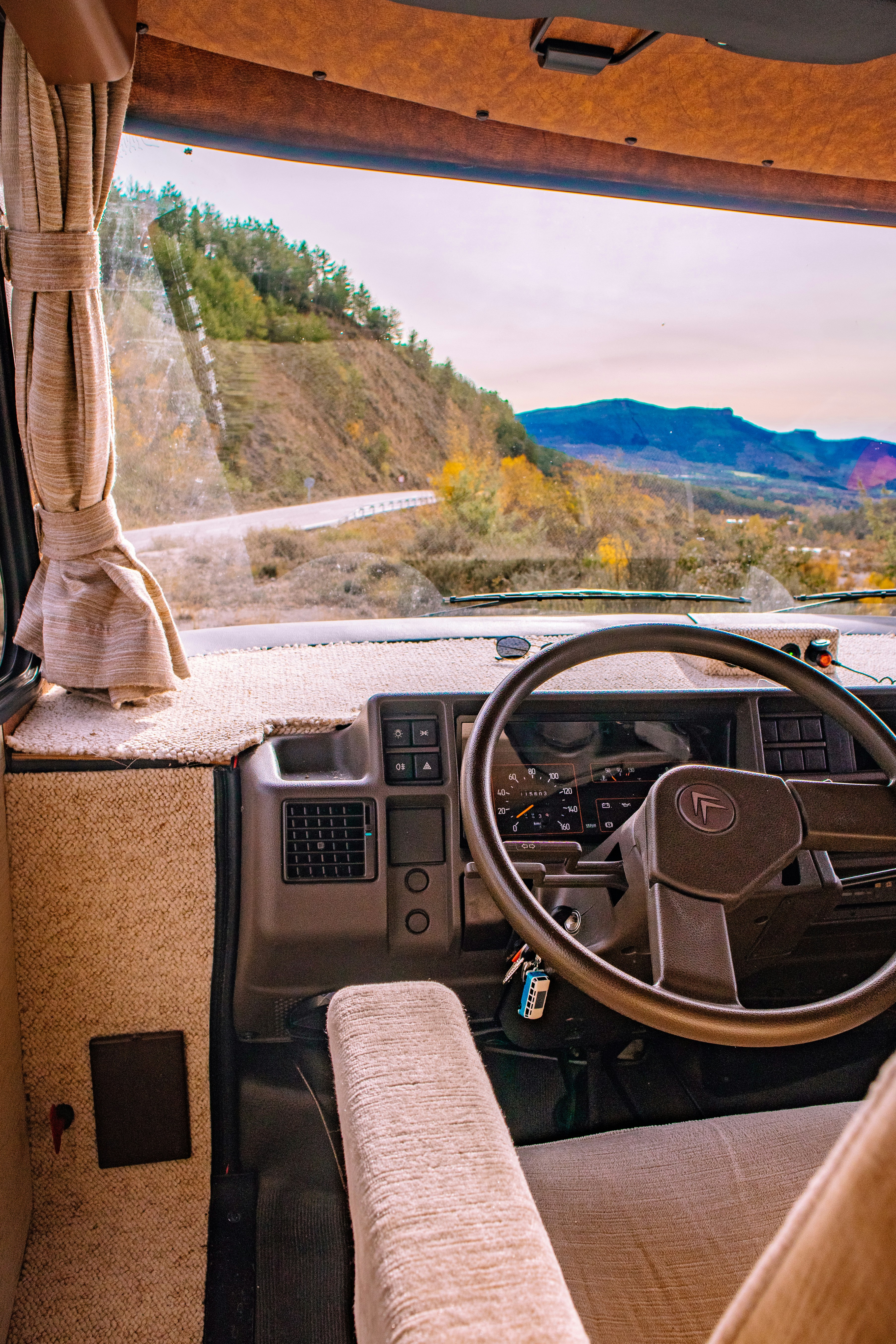 Driver's View: A Cozy Cabin-Centered Dash on a Scenic Highway