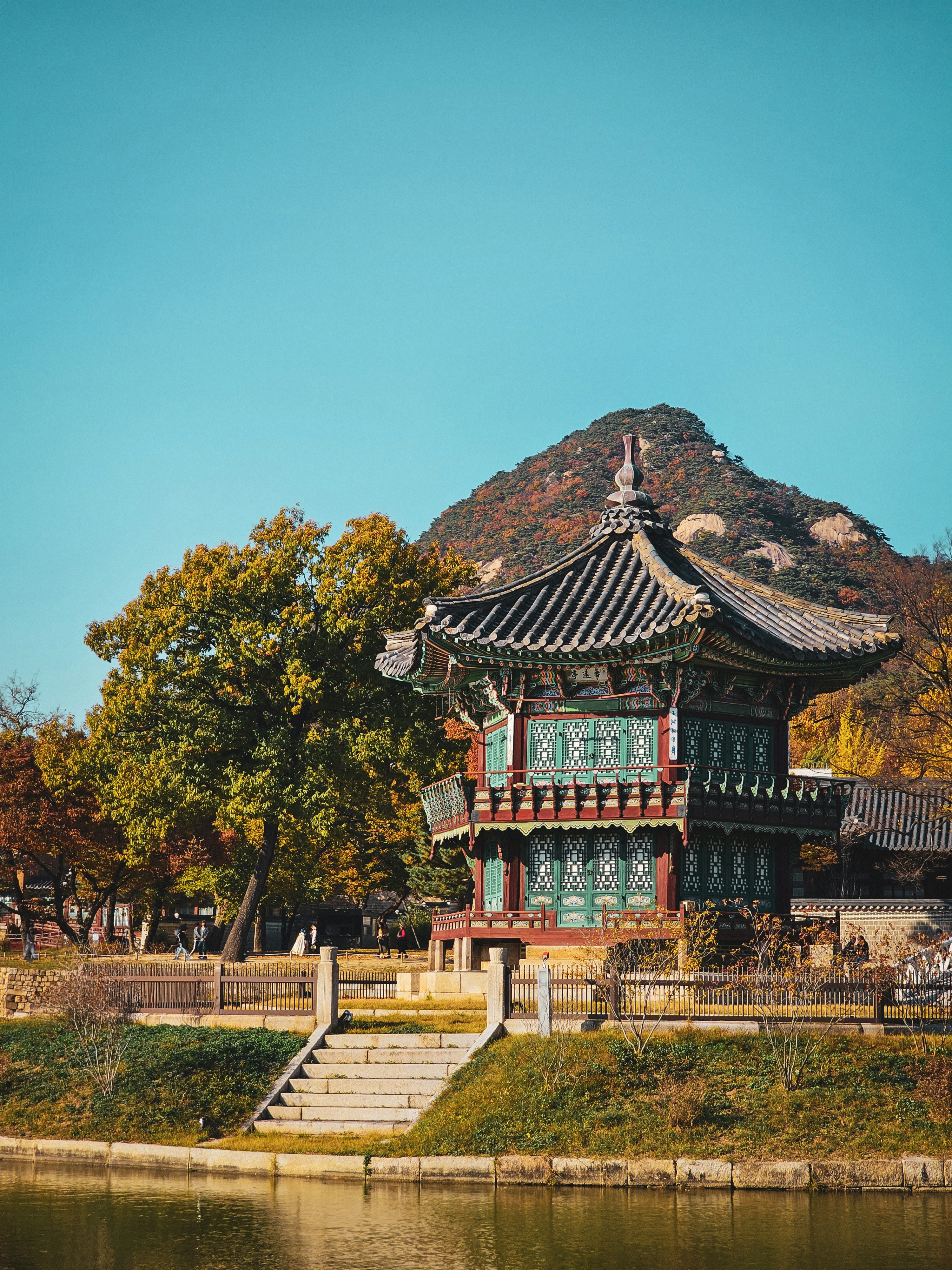 a pagoda in the middle of a lake