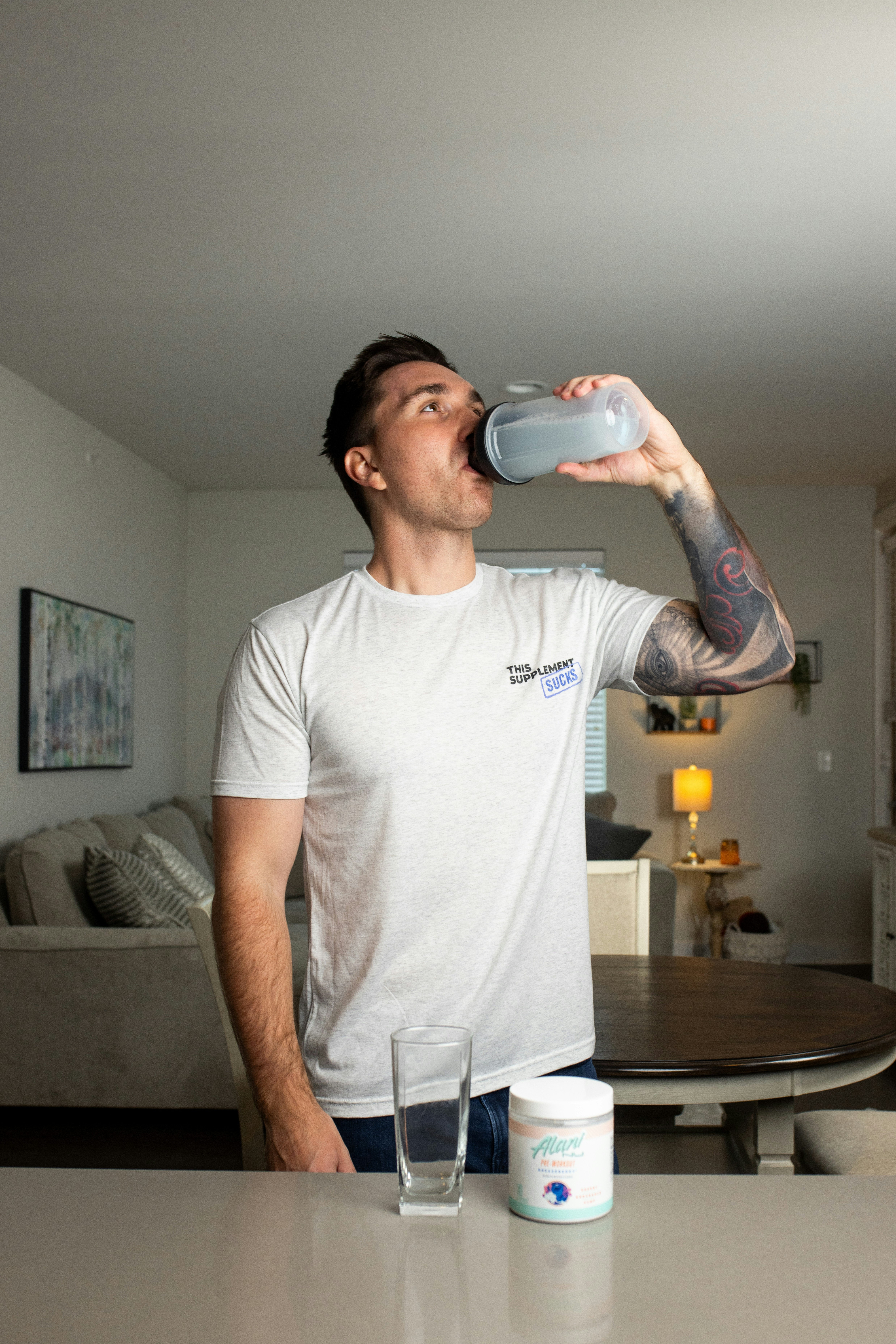 A man drinking water from a plastic cup photo – Free Sport Image on ...