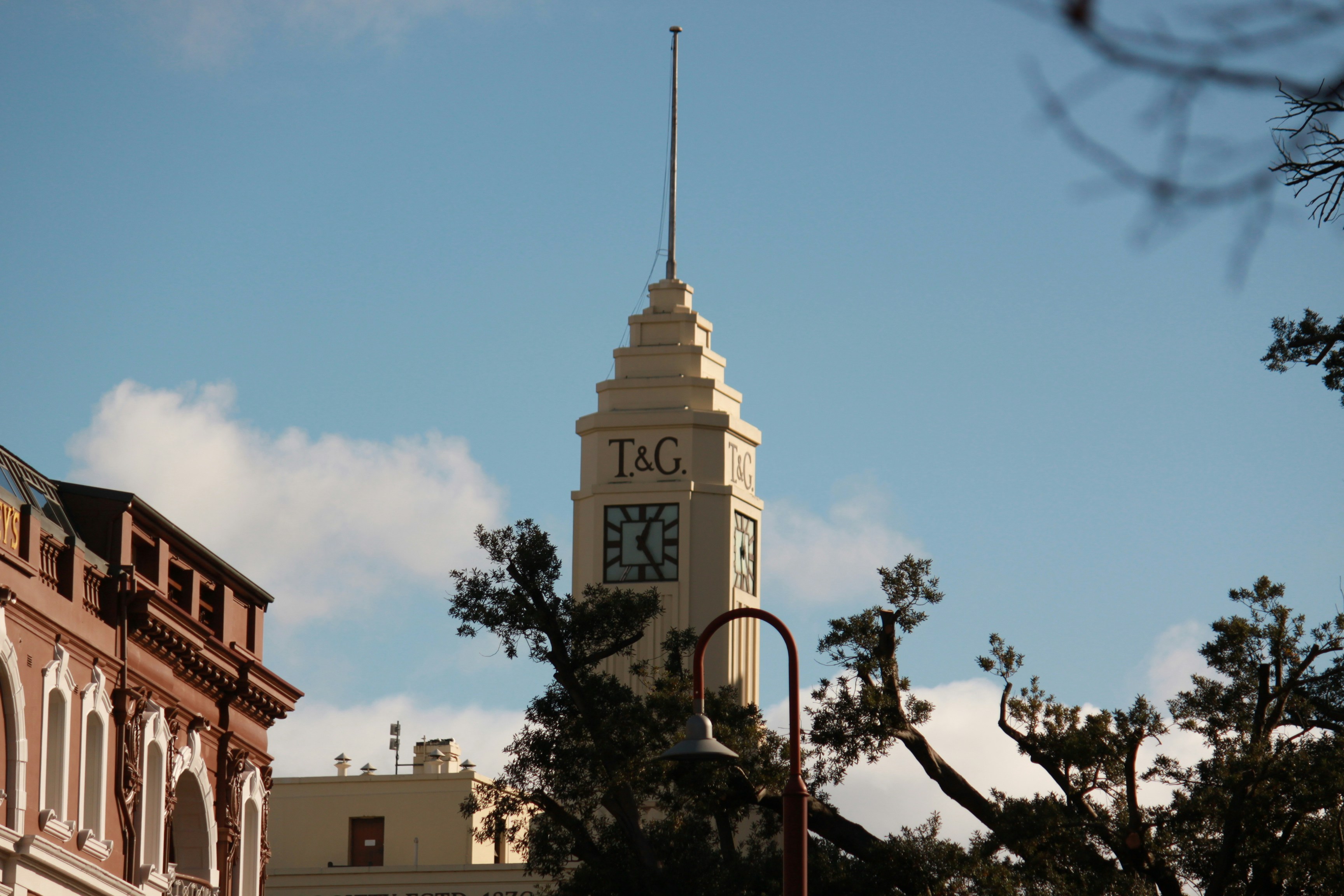 A tall clock tower towering over a city photo – Free Hobart tas Image ...