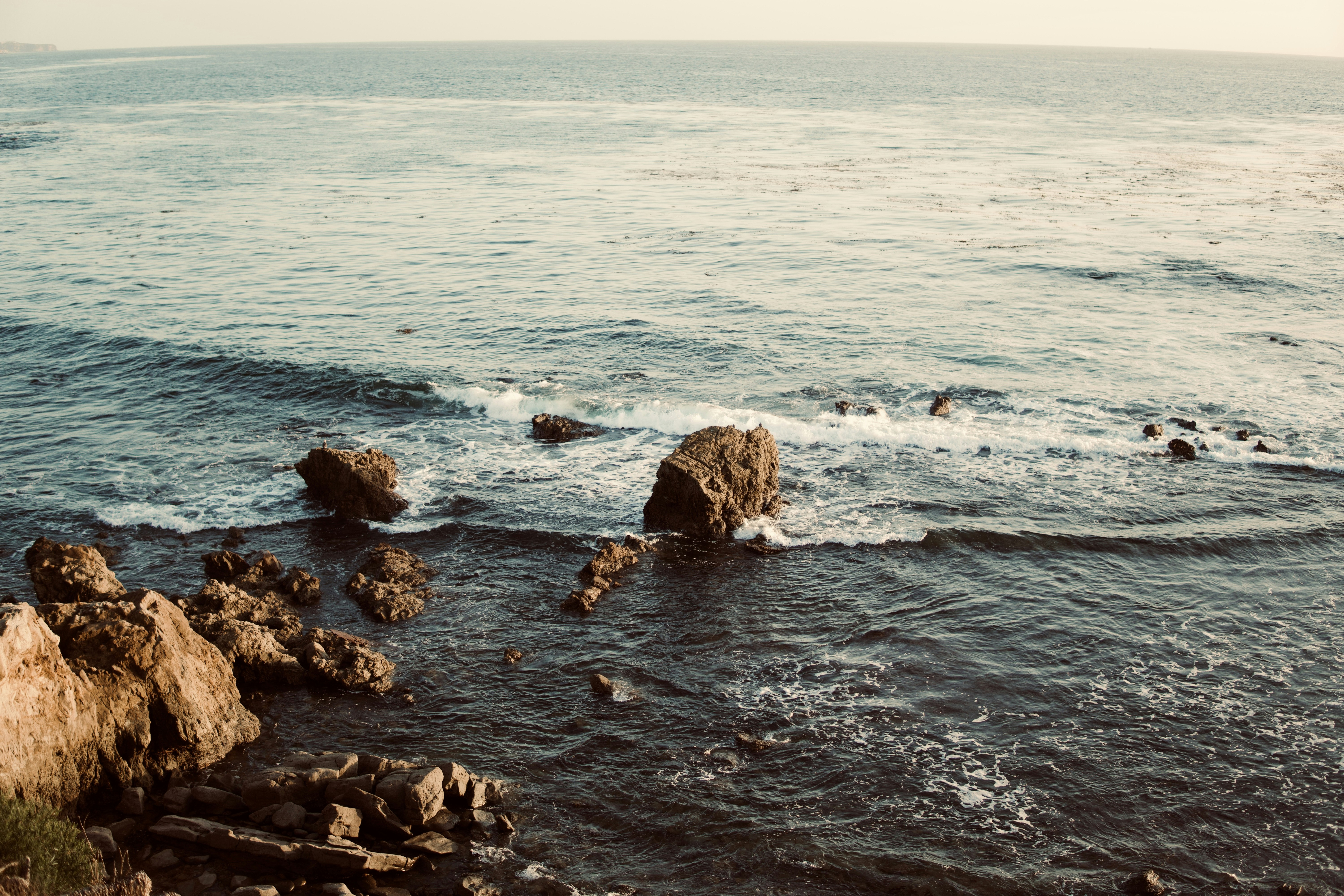 Tide's Edge: Weathered Rocks Carved by Quiet Atlantic