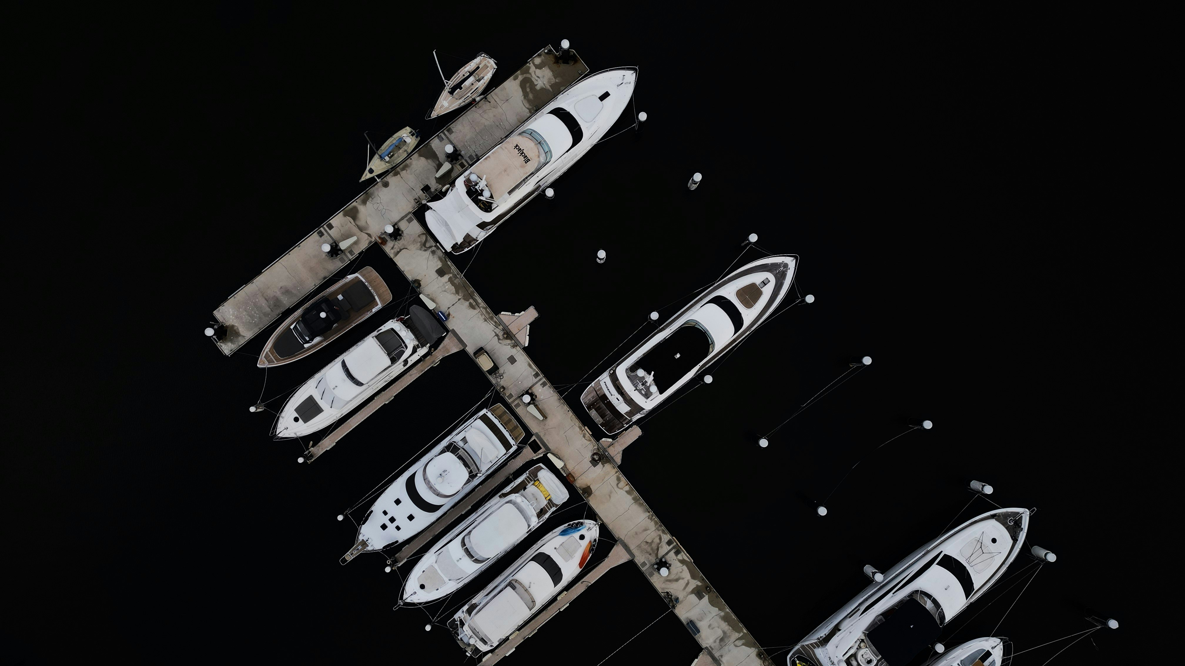Dock Matrix: Aerial Rhythm of Yachts and Pier