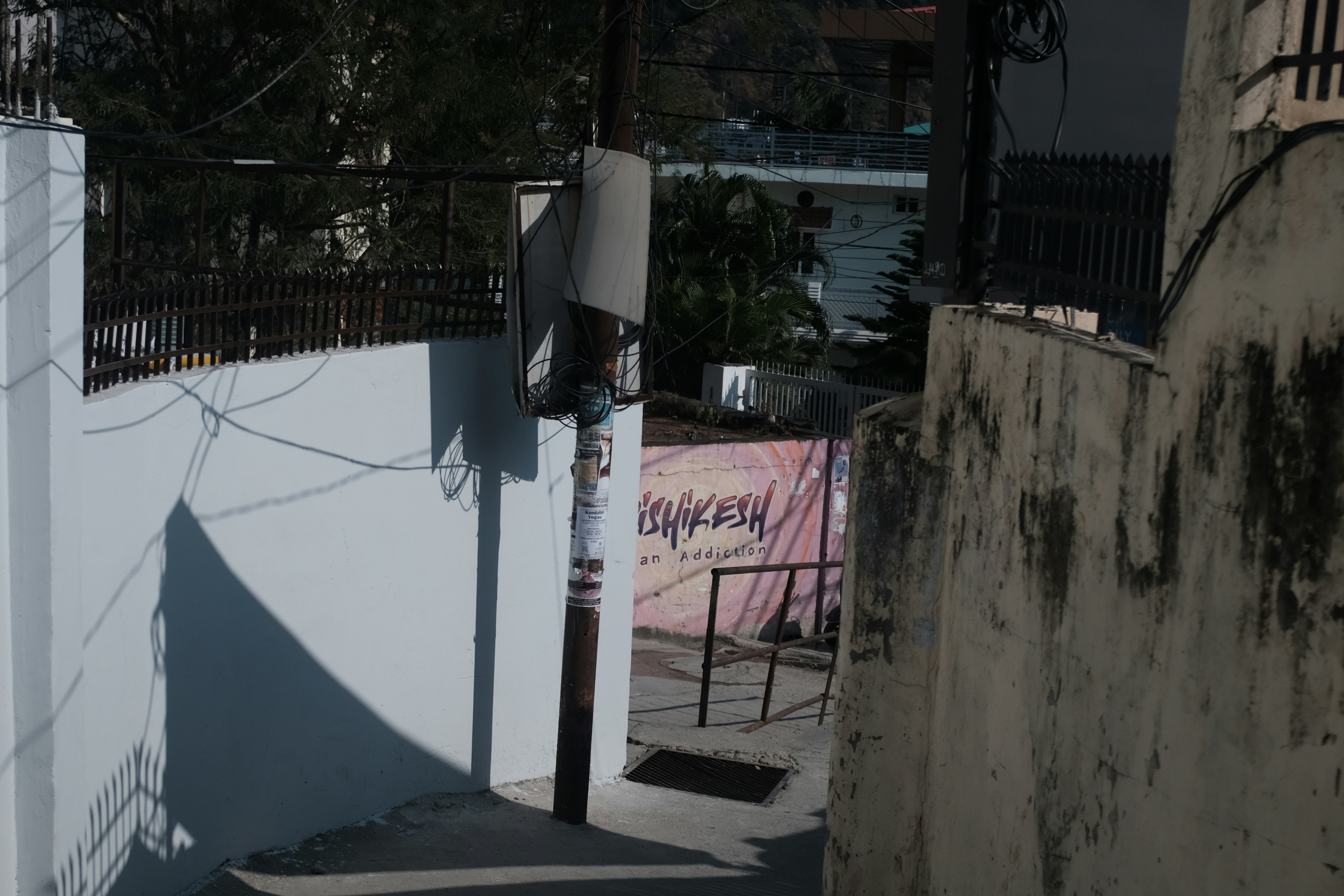 The shadow of a street sign on a wall photo – Free Rishikesh Image on ...