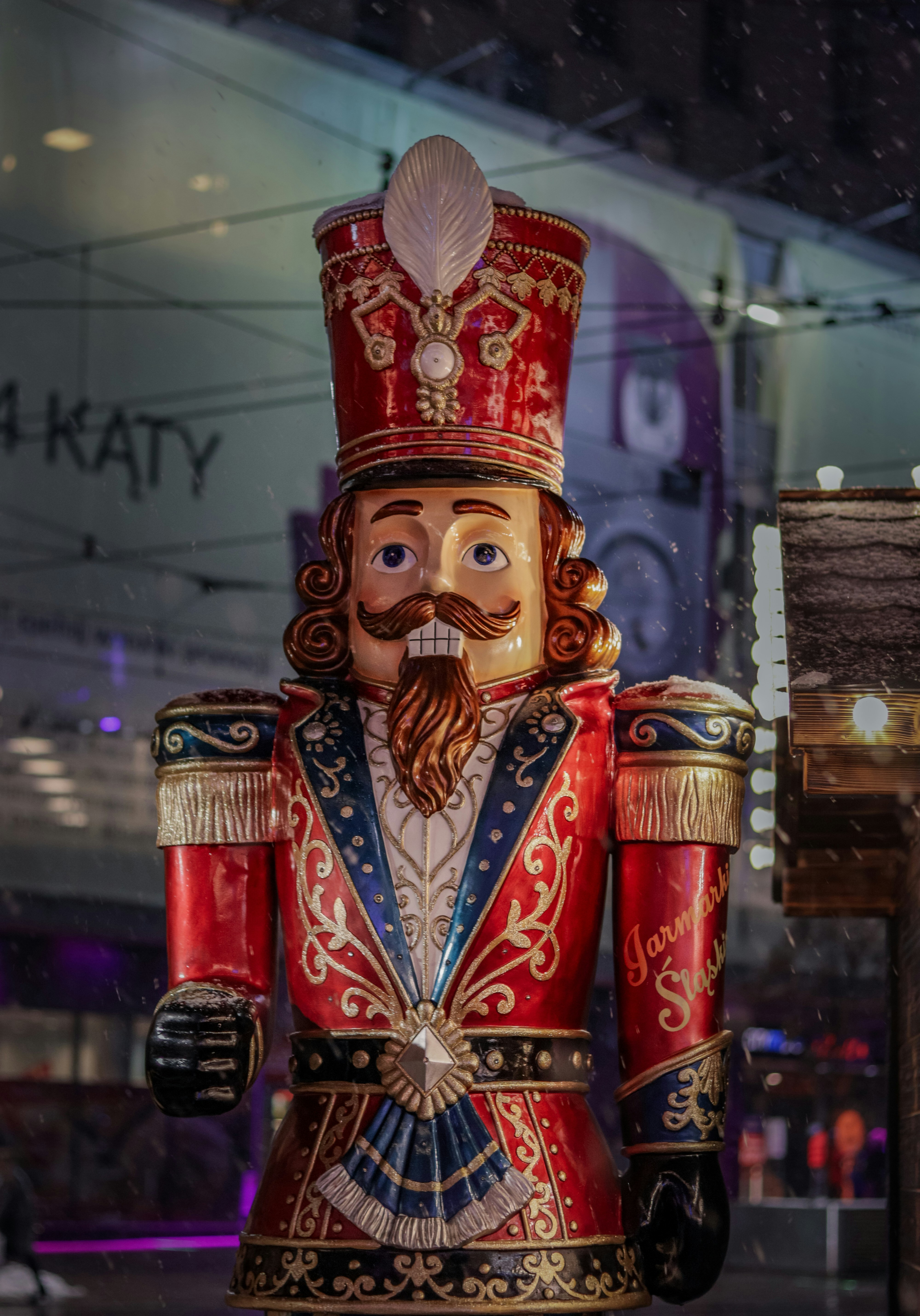 A statue of a nutcracker in a store window photo – Free Poland Image on ...