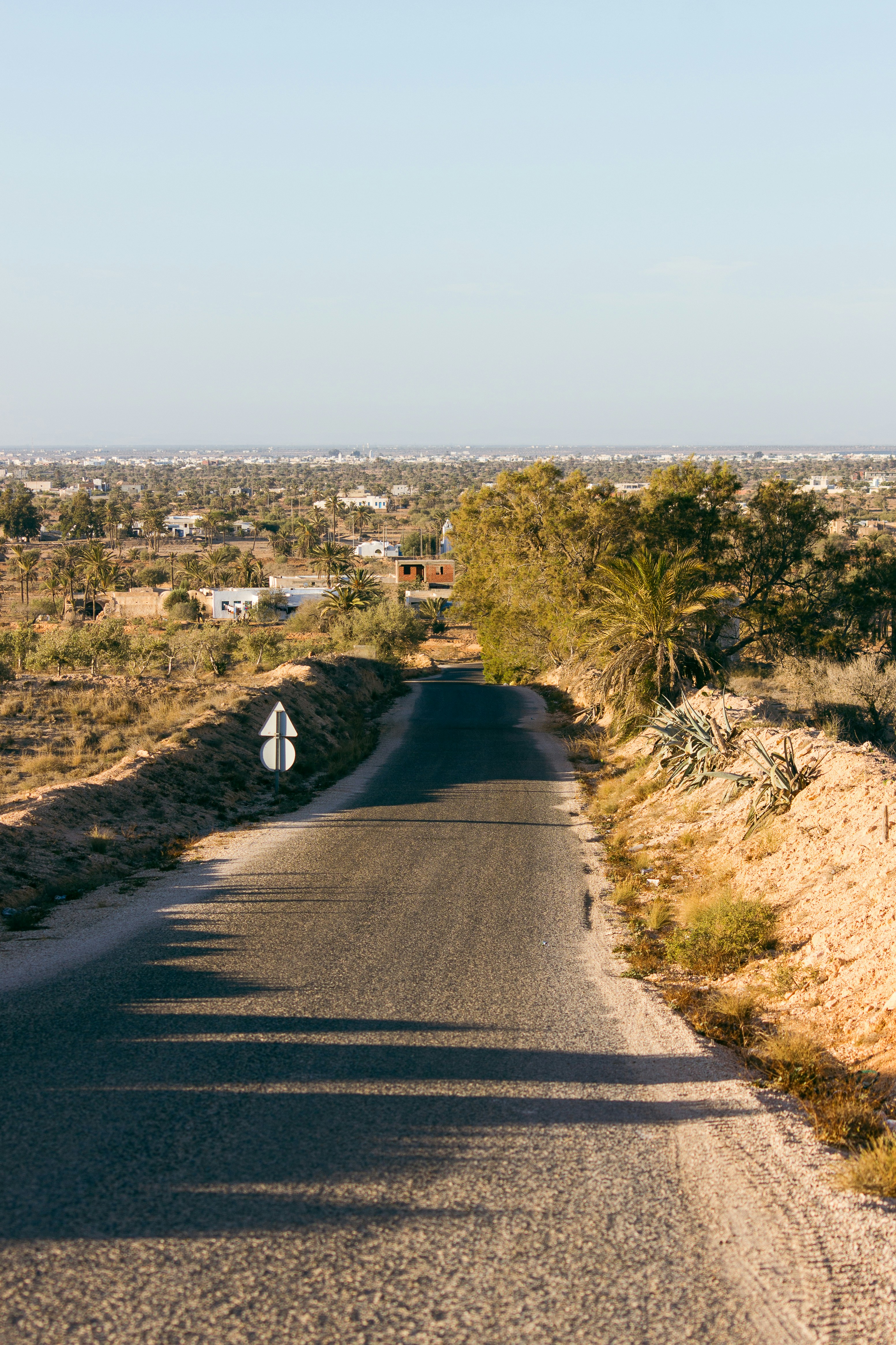 A street sign on the side of a road photo – Free Djerba Image on Unsplash
