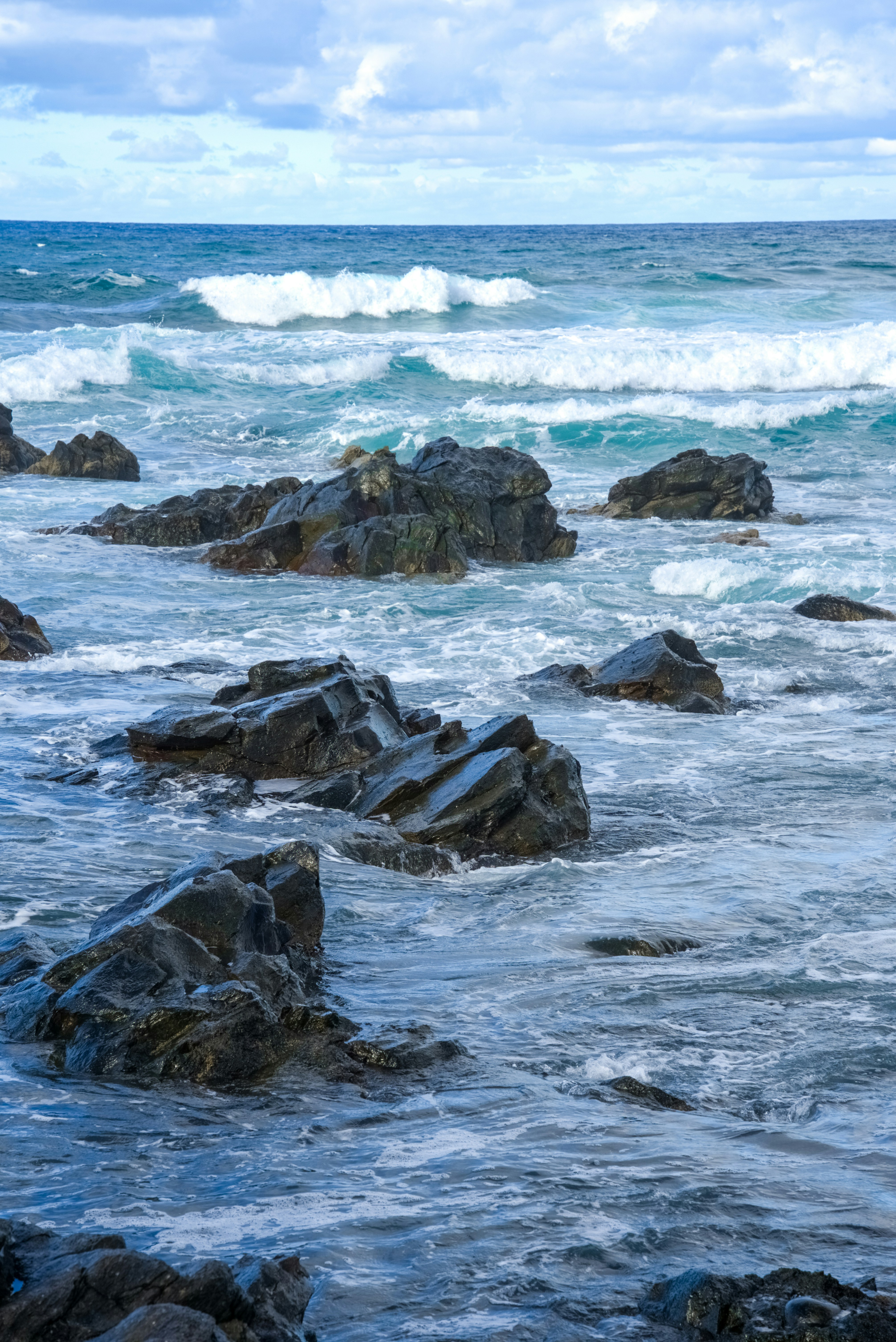 A person standing on rocks near the ocean photo – Free Gran canaria ...