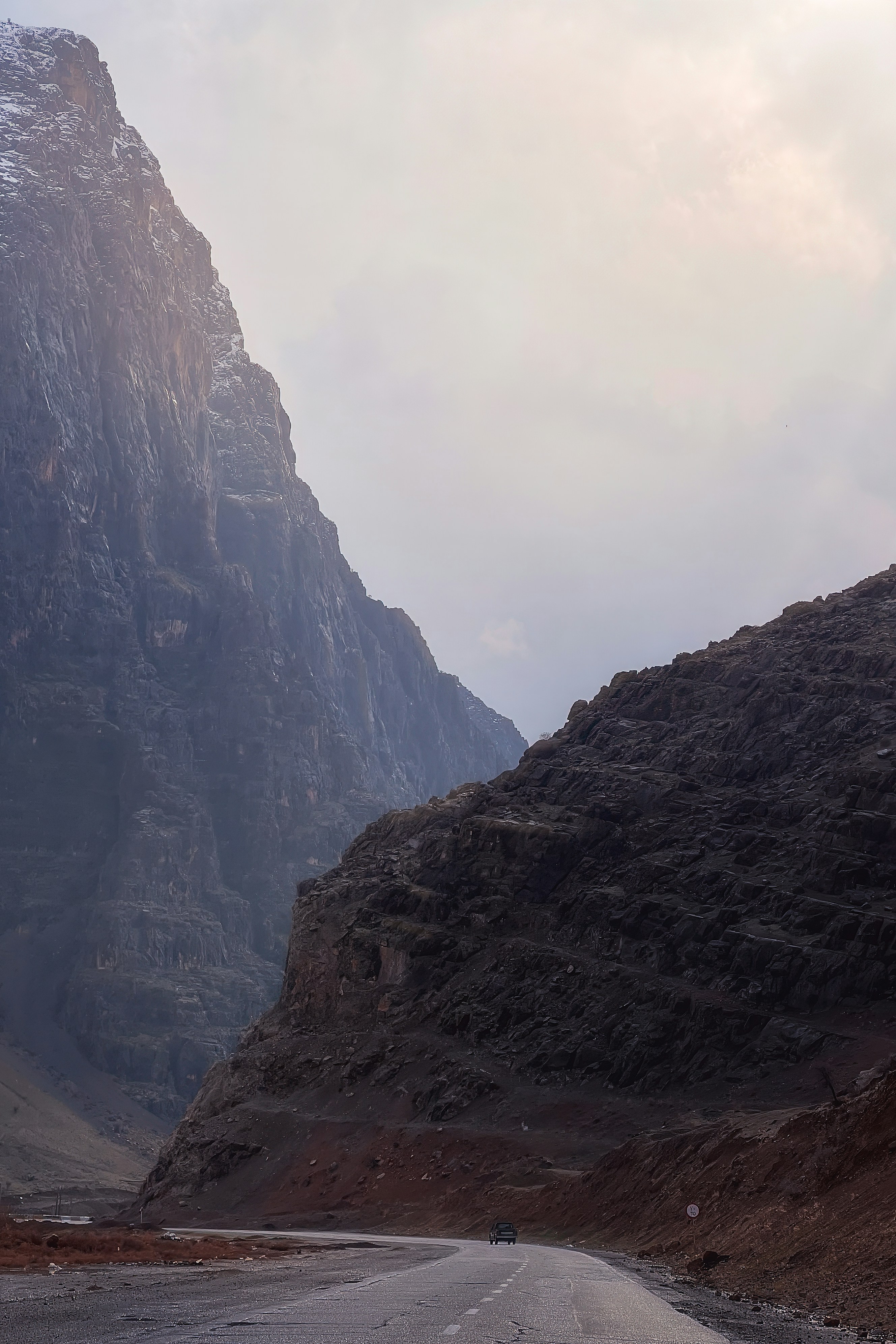 Lone Car on the Vein of a Mountain Gorge