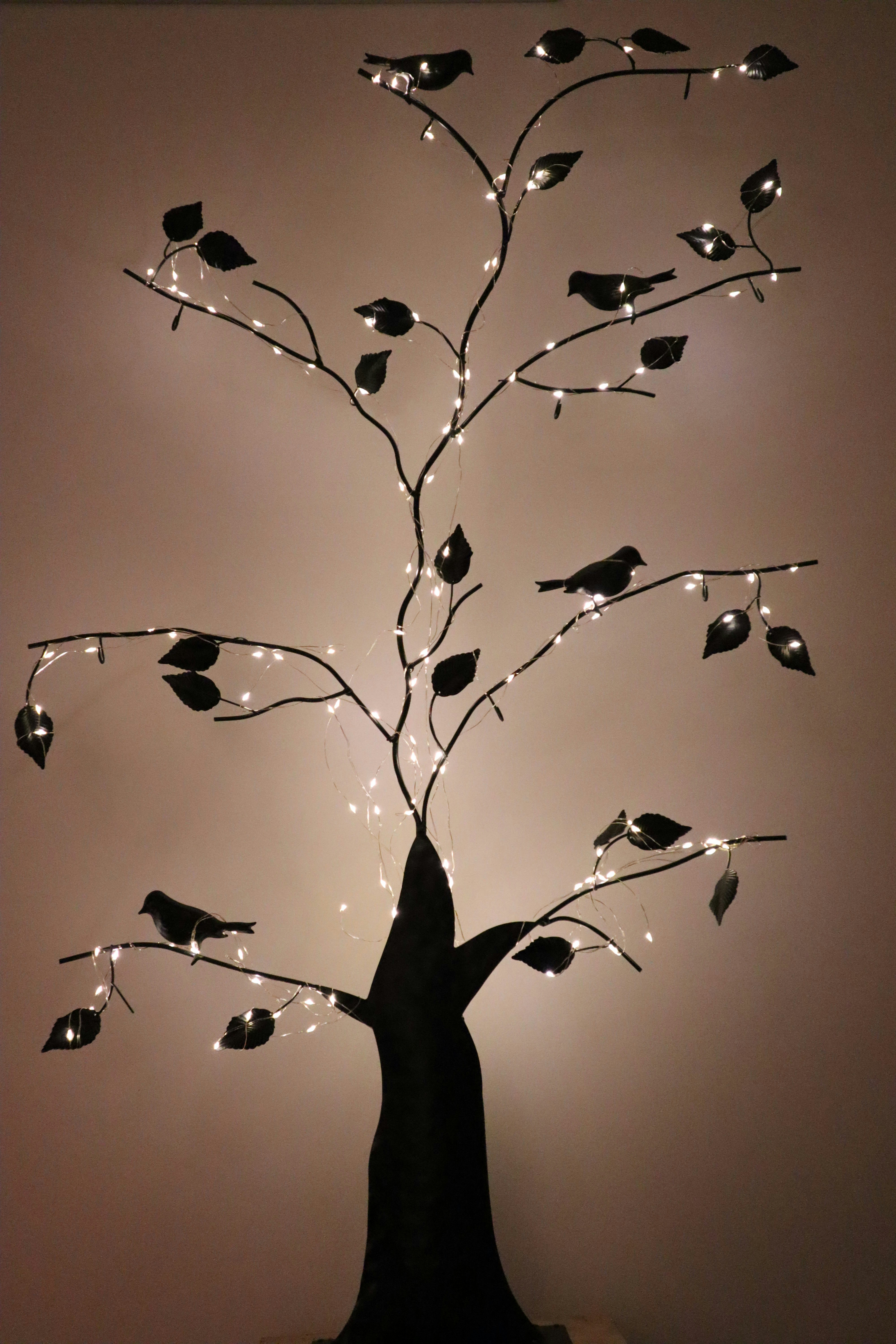 A lighted tree with birds sitting on it photo – Free Art living room ...