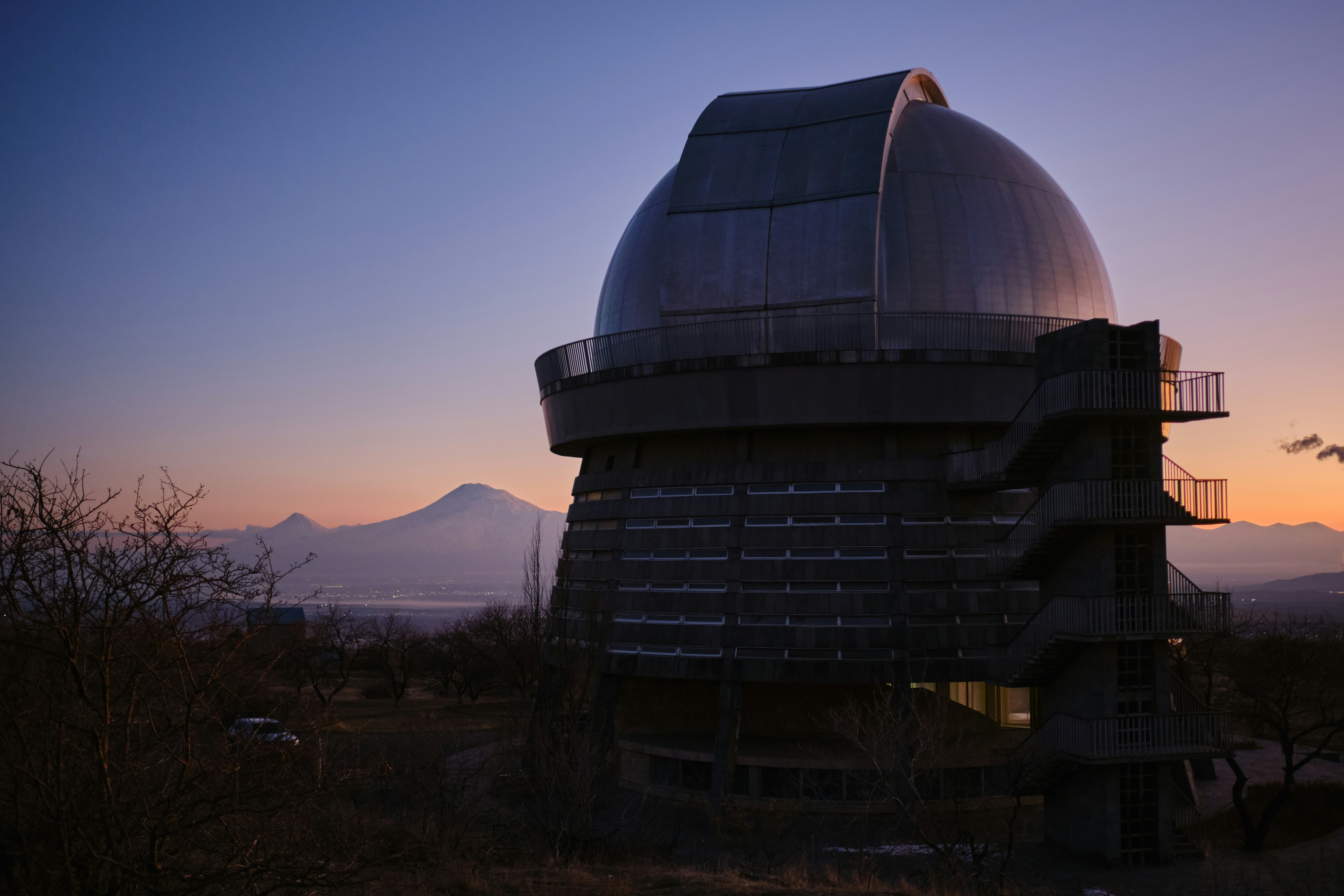 a large metal dome sitting on top of a hill