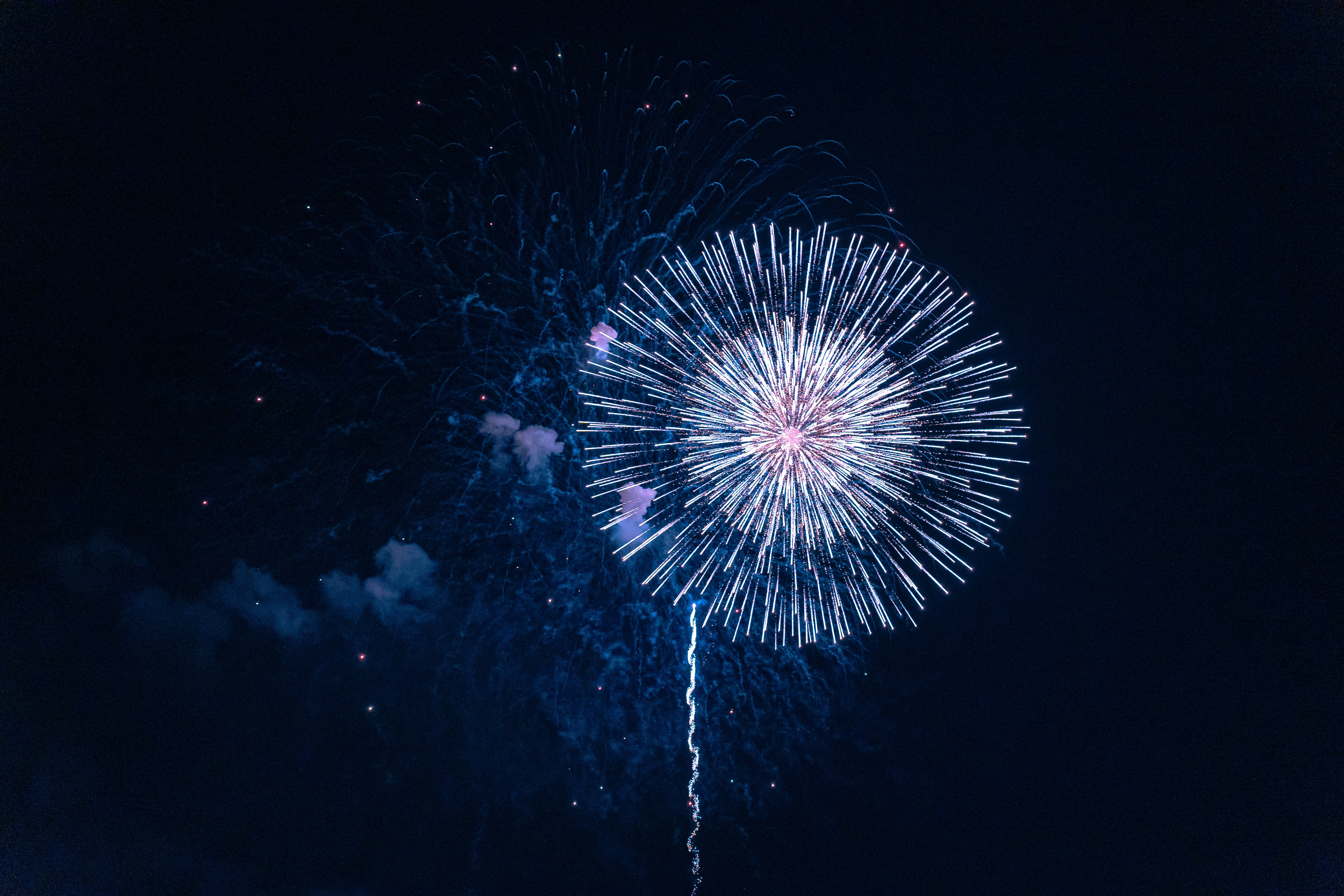 A large fireworks is lit up in the night sky photo – Free Saitama ...