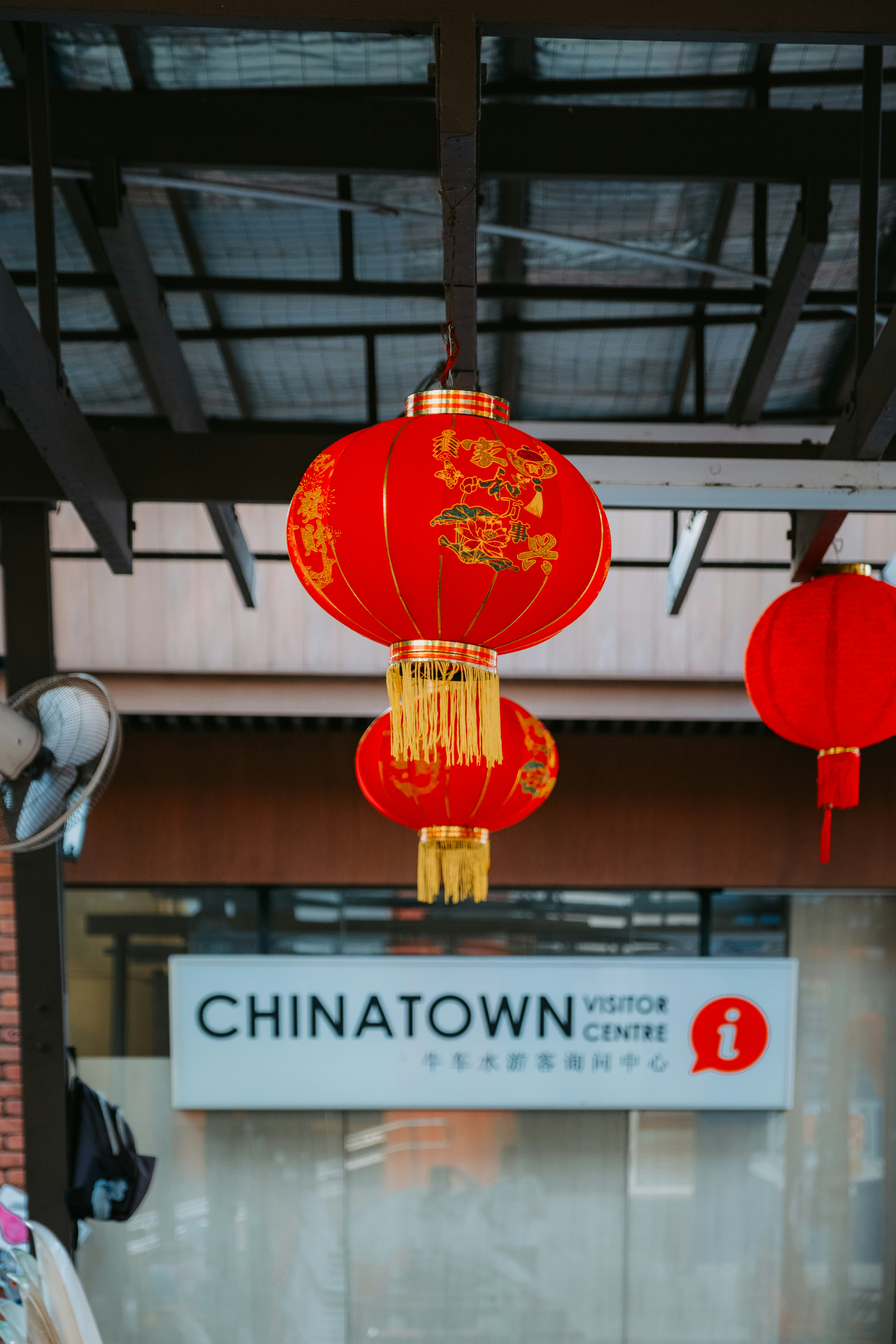 Crimson Lanterns Framing Chinatown’s Welcome Sign