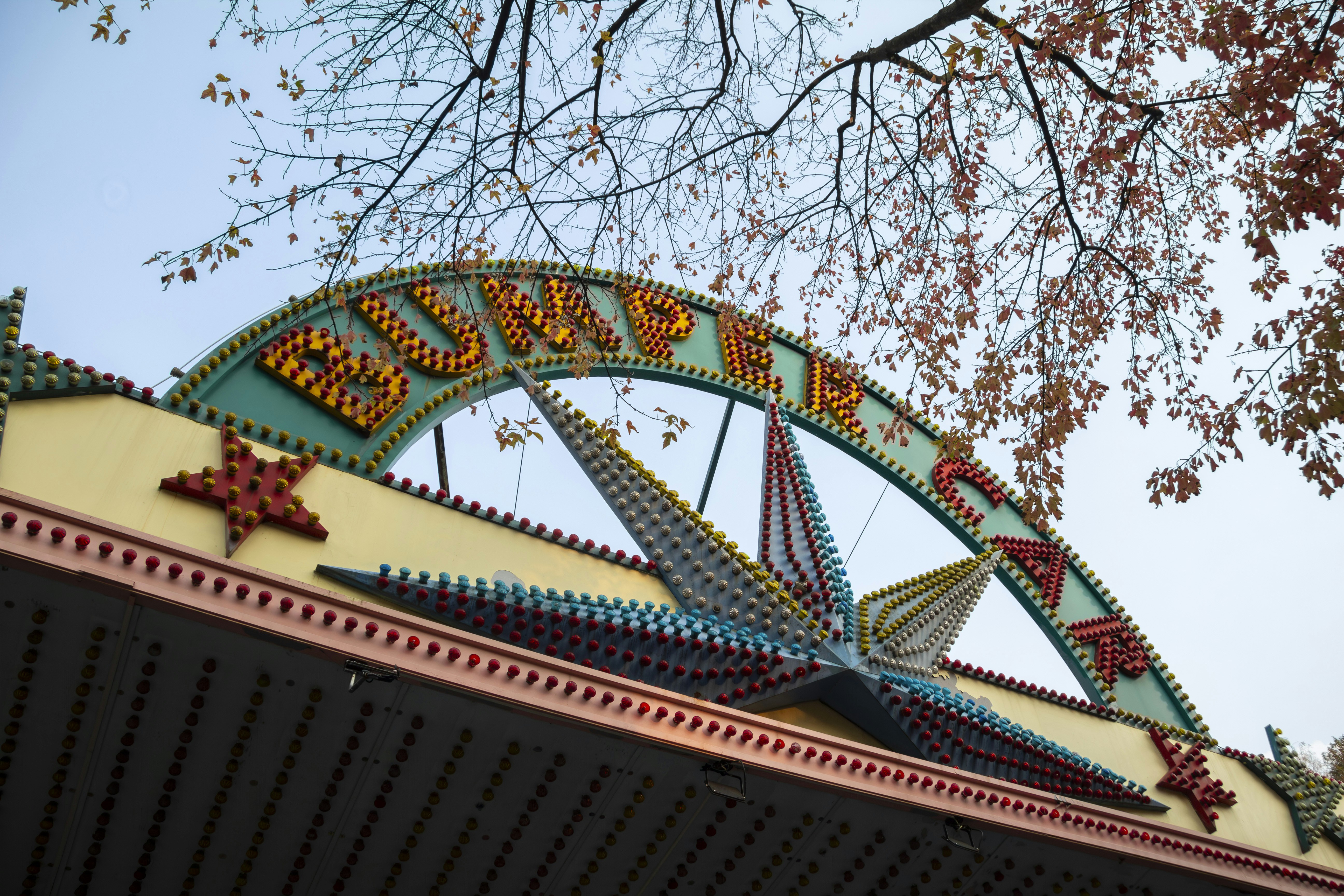 Neon Carnival Arch: A Tilted Neon Sign Overhang