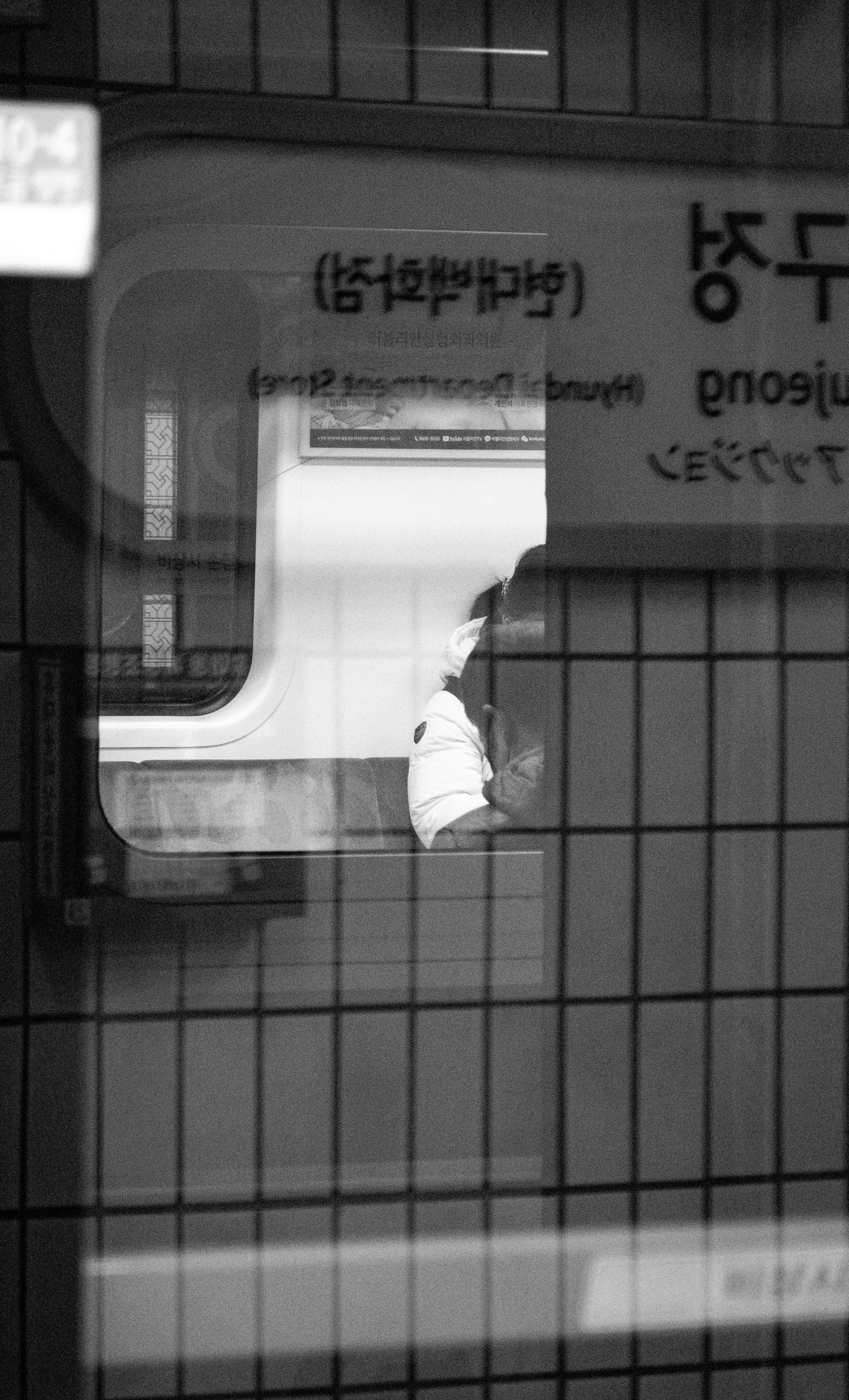 A subway station with a person in the window photo – Free Seoul Image ...