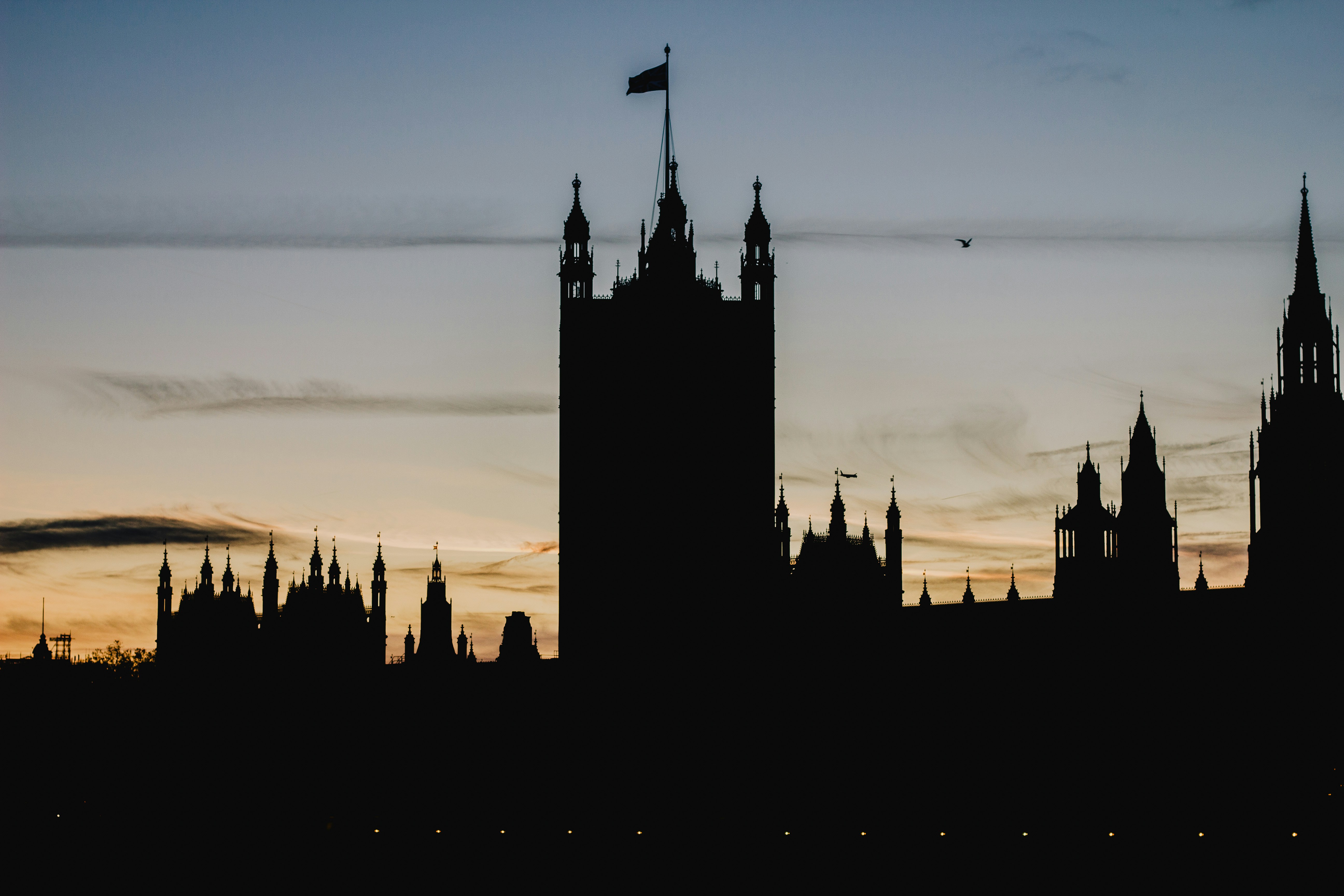 Dusk over a Flag-Topped Gothic Skyline