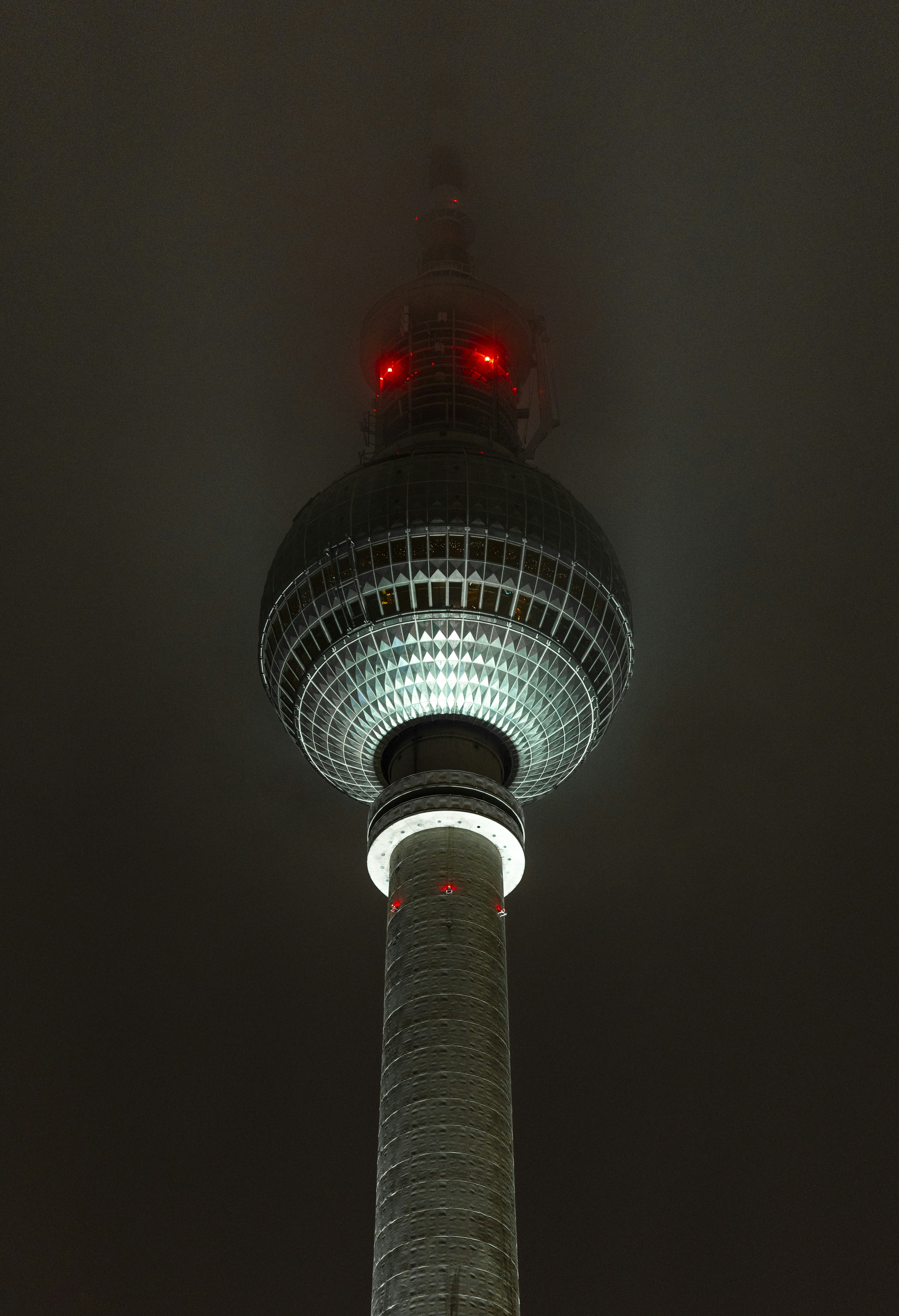 A tall tower with a red light on top of it photo – Free Berliner ...