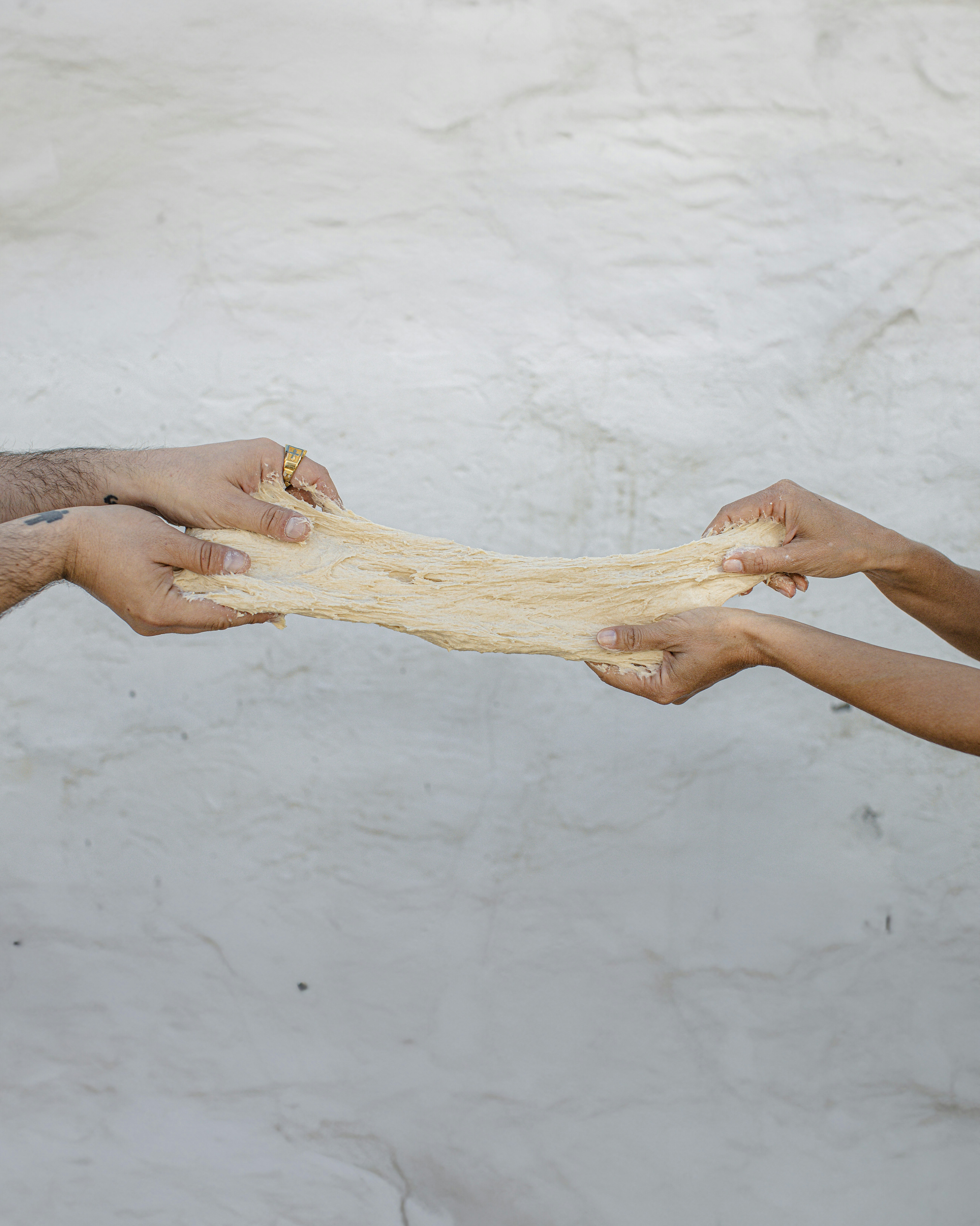 A group of people reaching out their hands to each other photo – Free ...