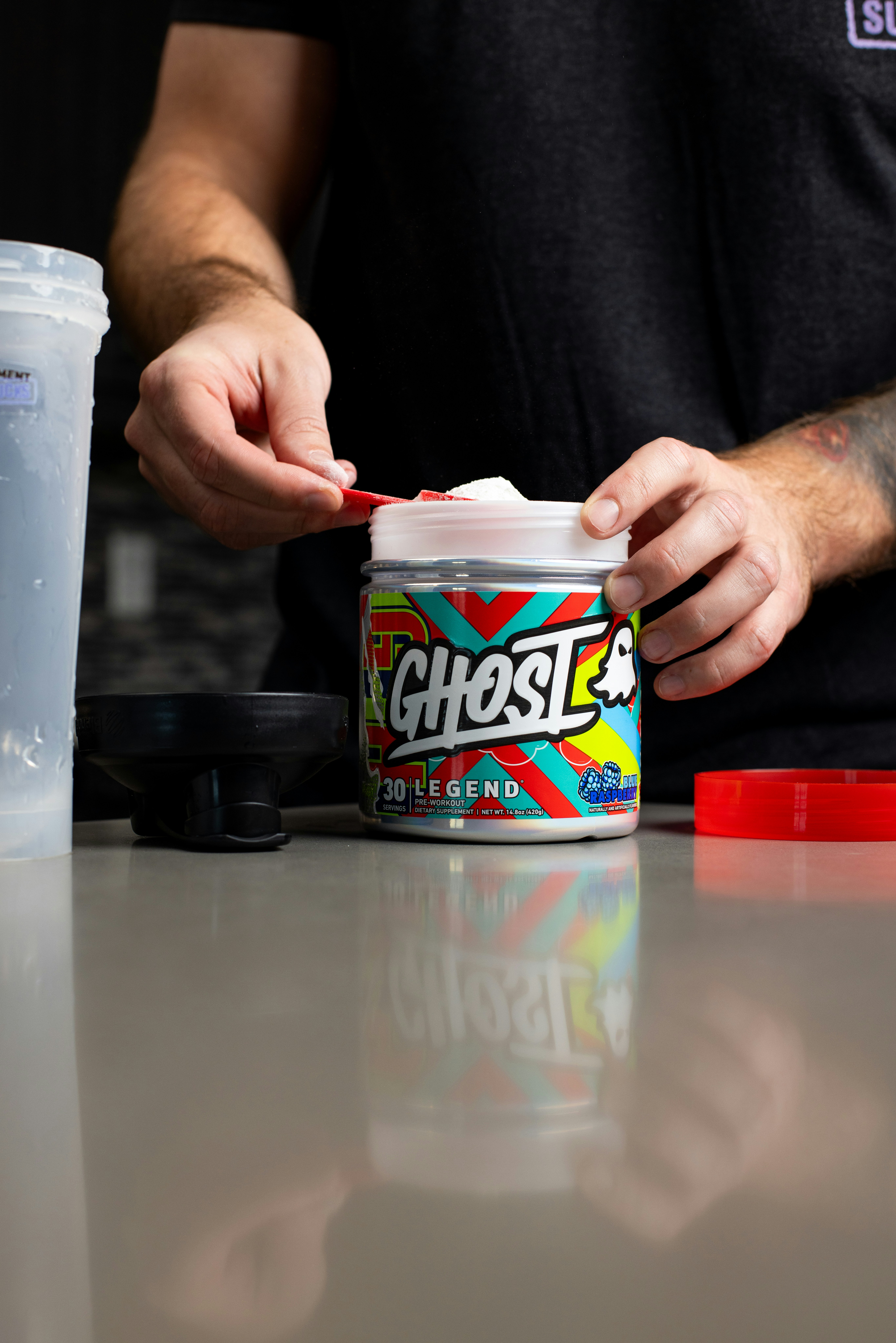 A man is holding a container of ghost candy photo – Free Sport Image on ...