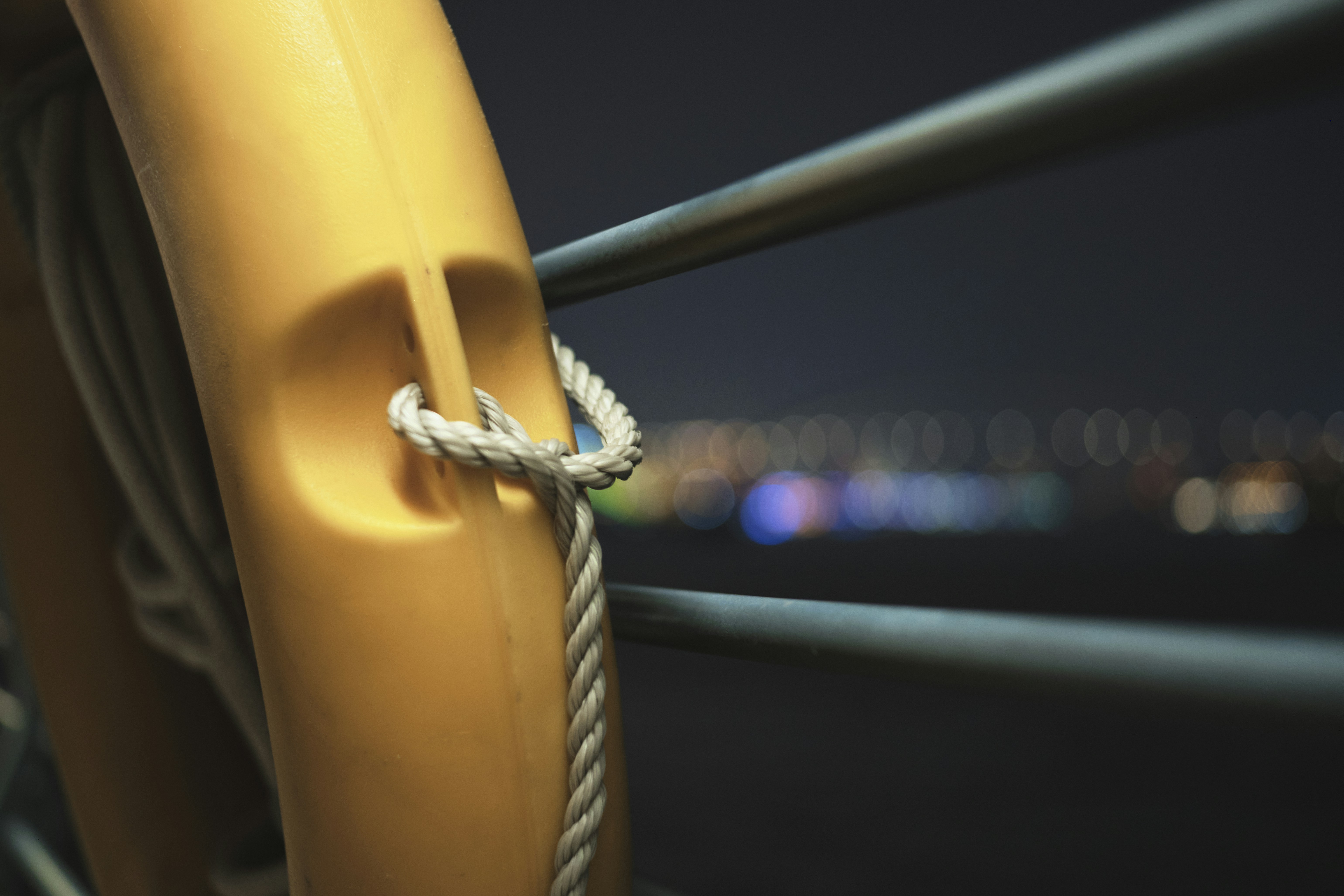 Golden Ring and Rope: Night Scene on a Pier