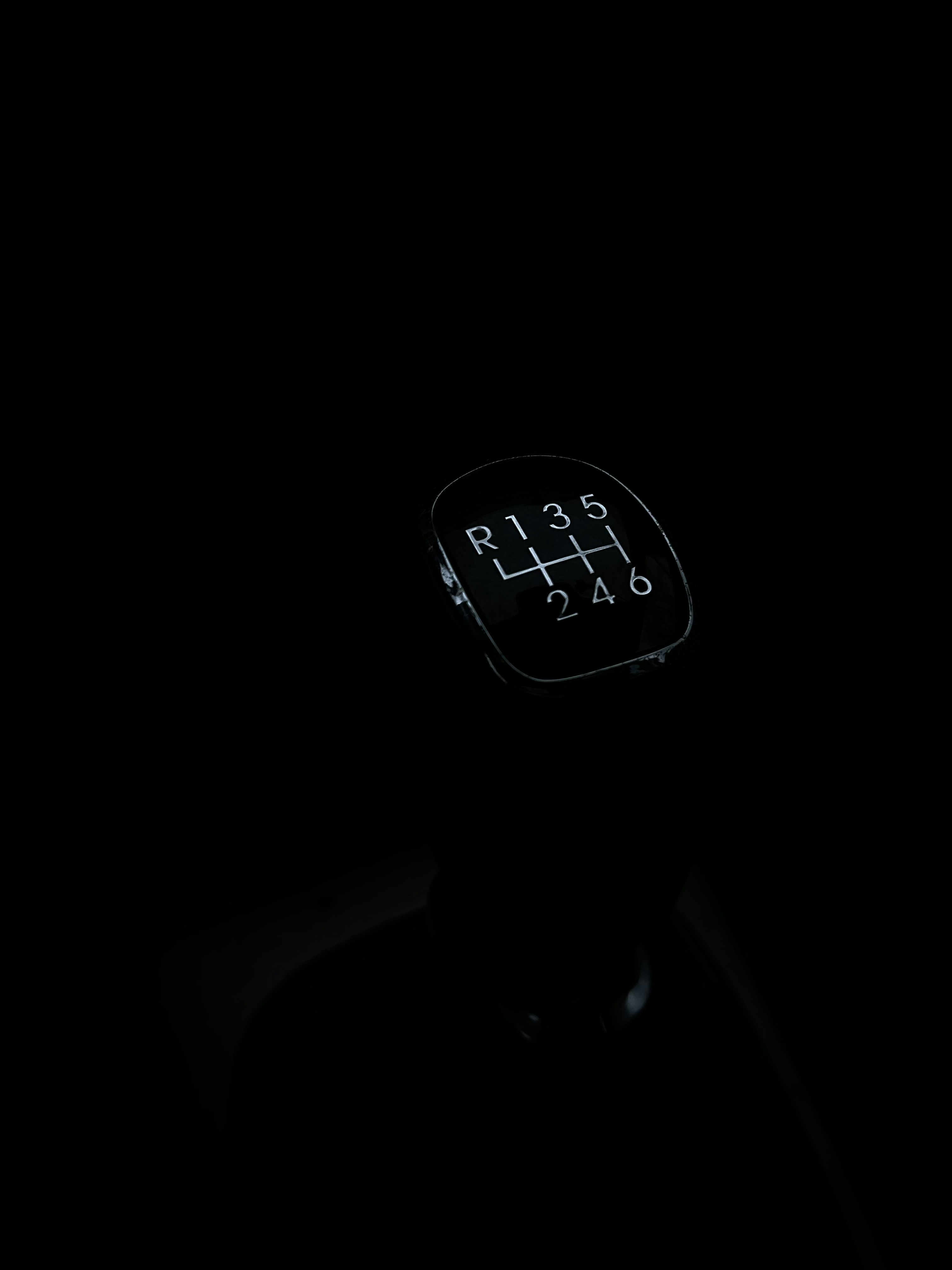 Midnight Manual: A Close-Up of the Gear Knob and Its 5‑Speed Pattern