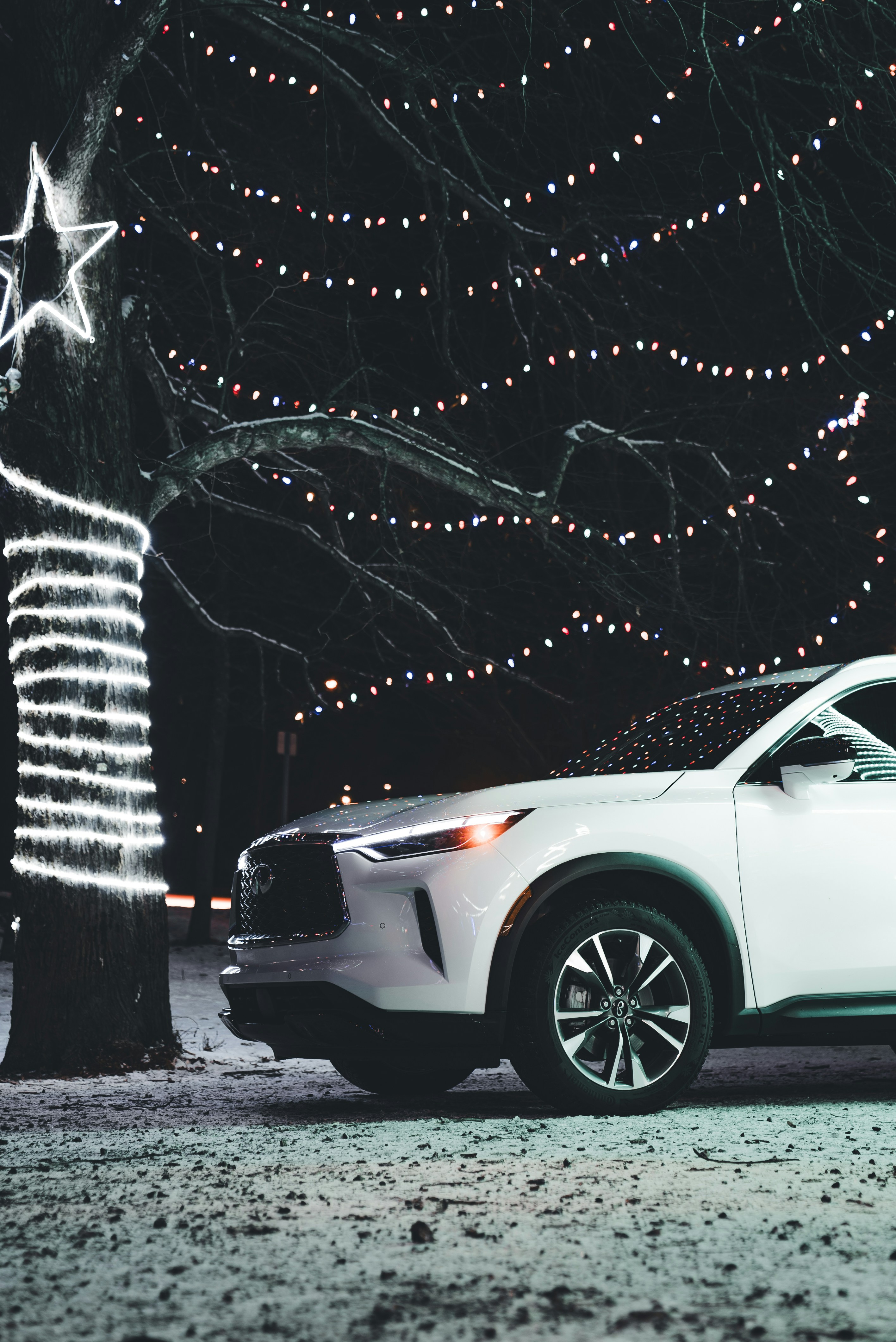 Glowing Festive Lights Meet Modern White SUV