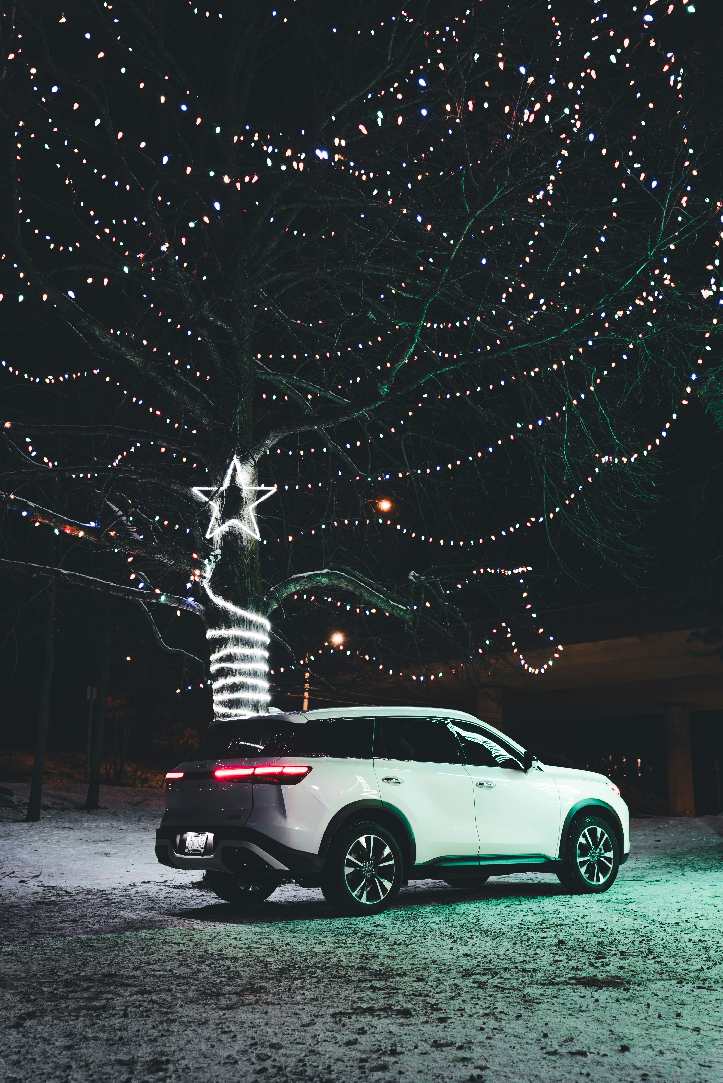 Neon-Star SUV Under a Night Sky of Fairy Lights