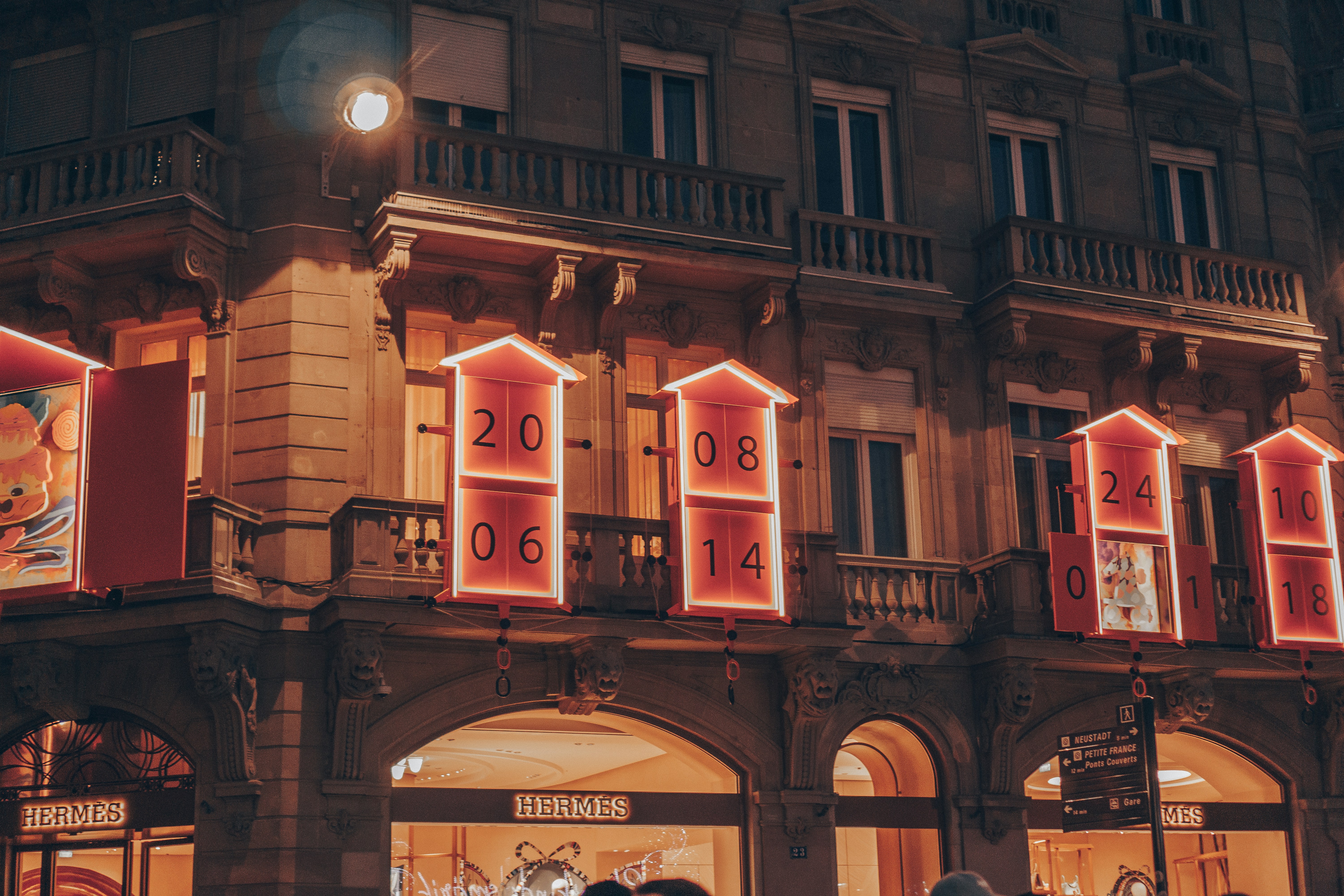 Glowing Advent Letters Over a Elegant Facade