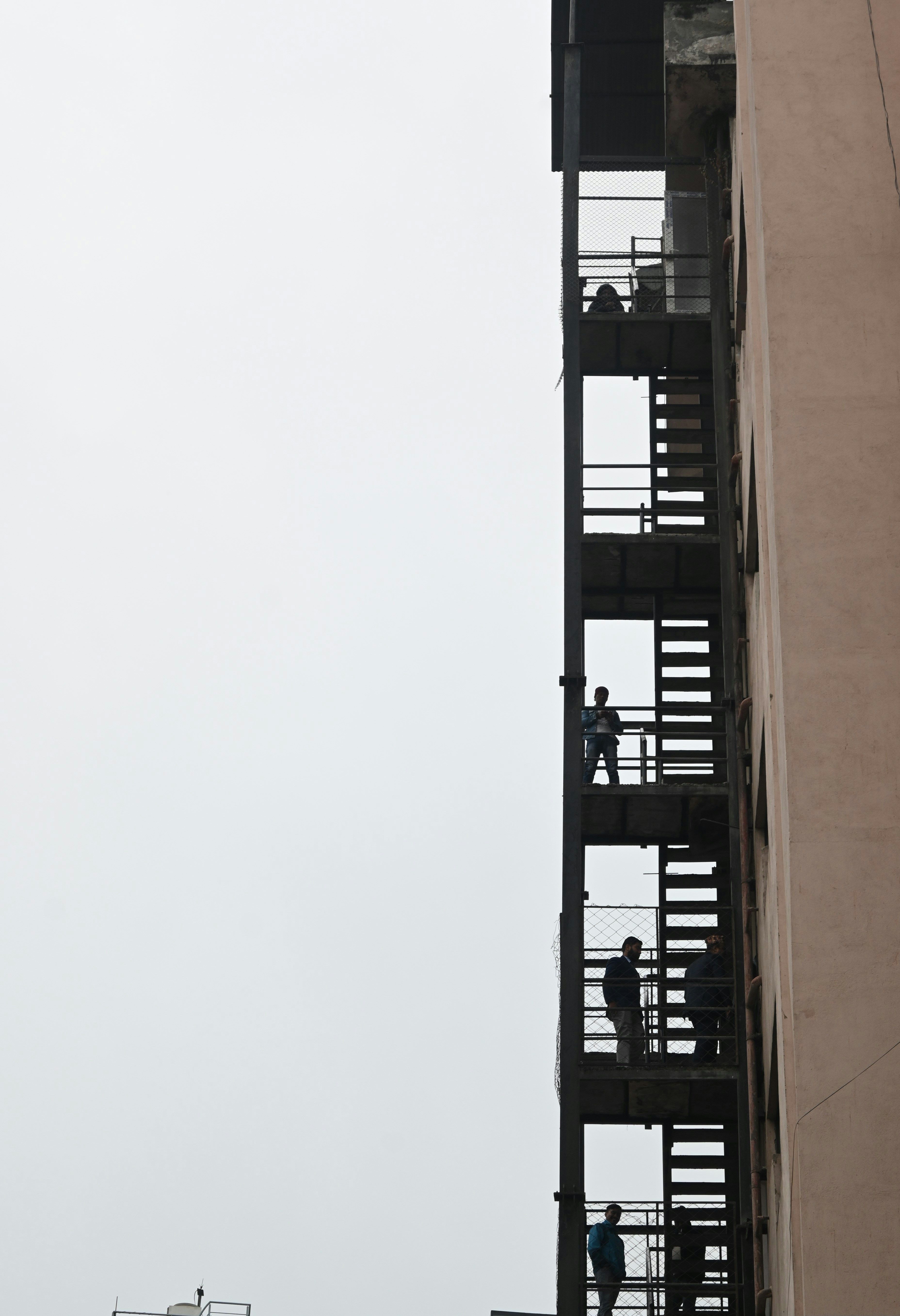 A group of people standing on top of a tall building photo – Free Nepal ...