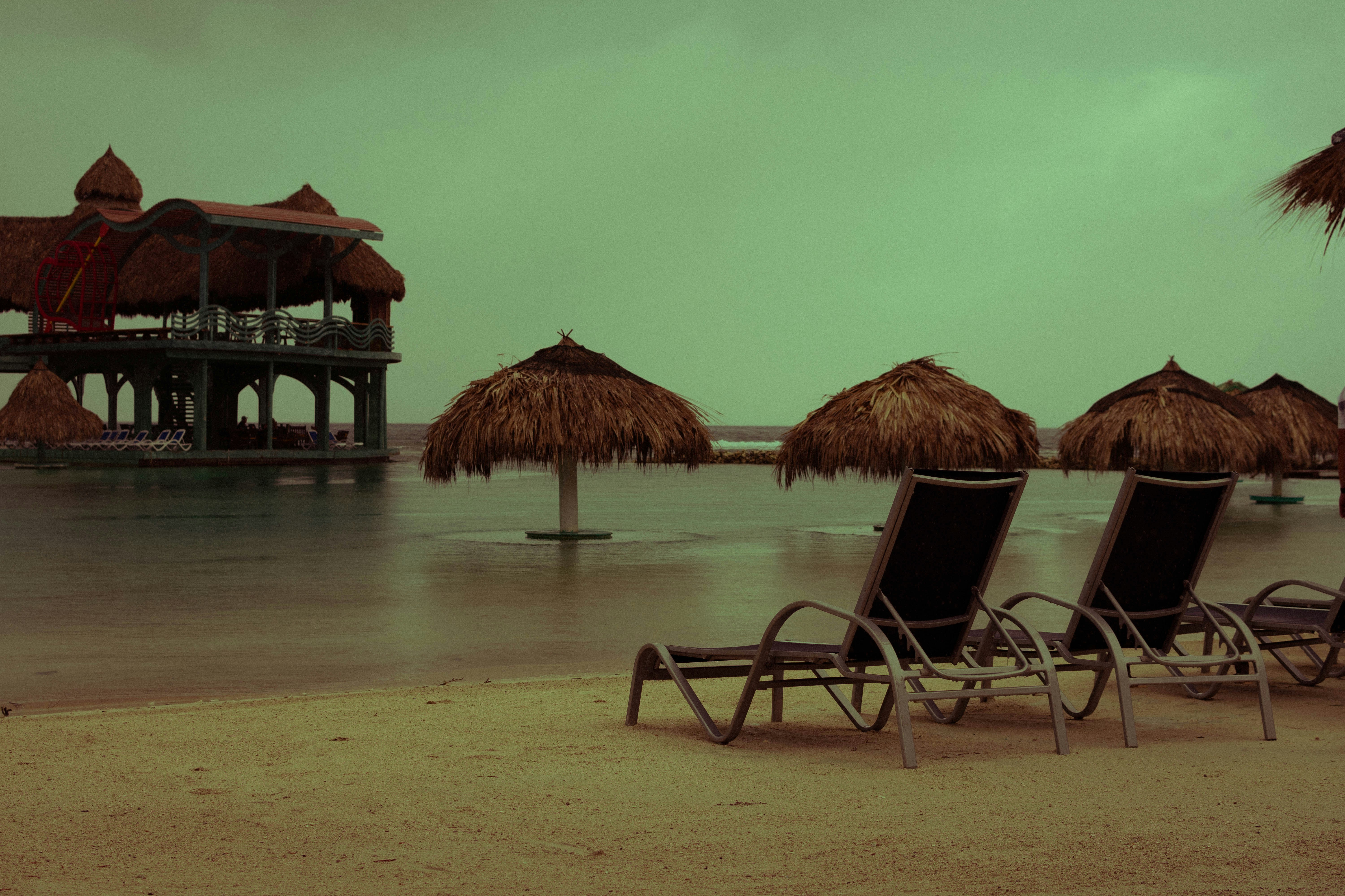 Sun Loungers by the Lagoon: A Quiet Beachfront Scene