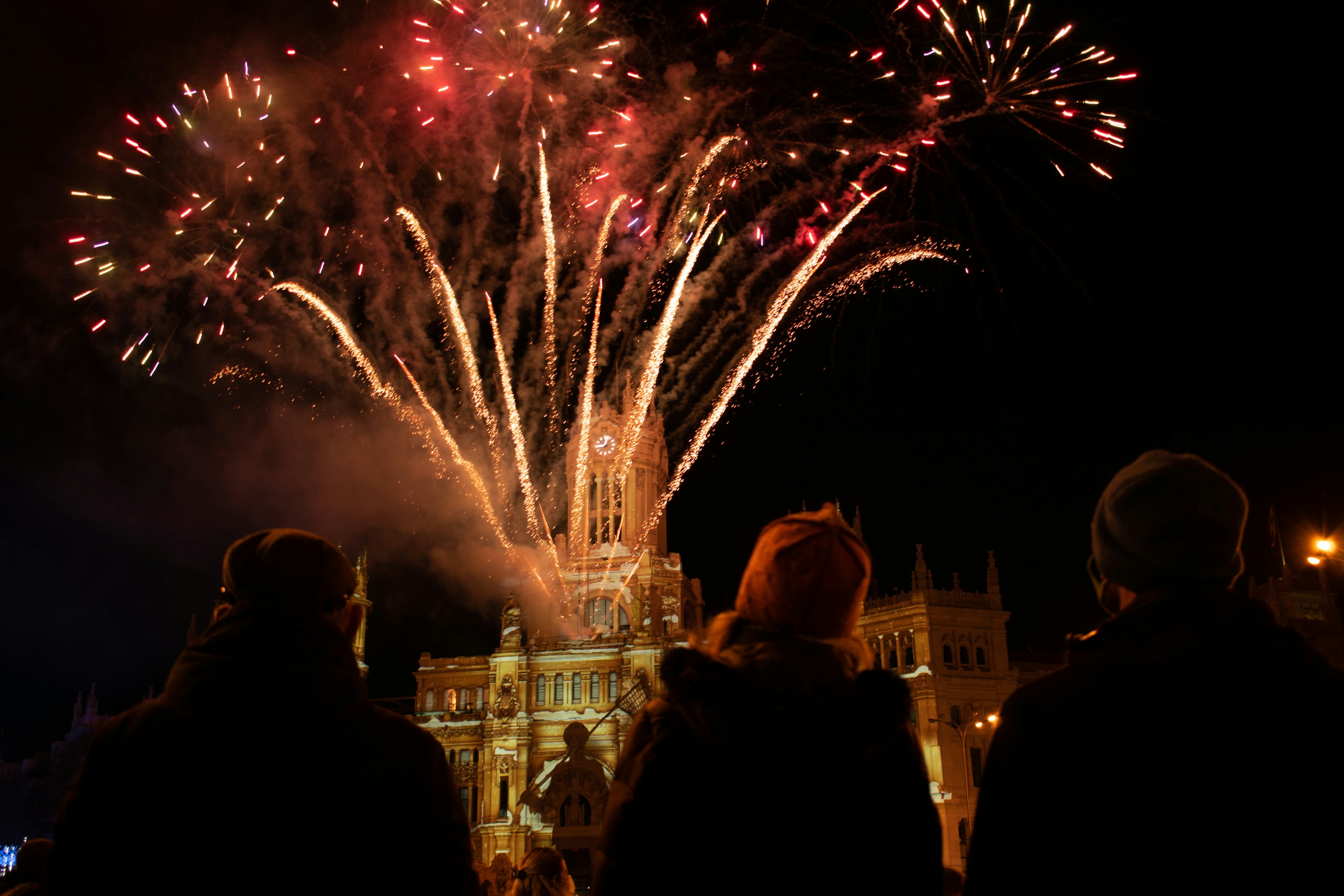 Fireworks Over a Gothic Cathedral: Silhouettes in a Lantern-lit Square