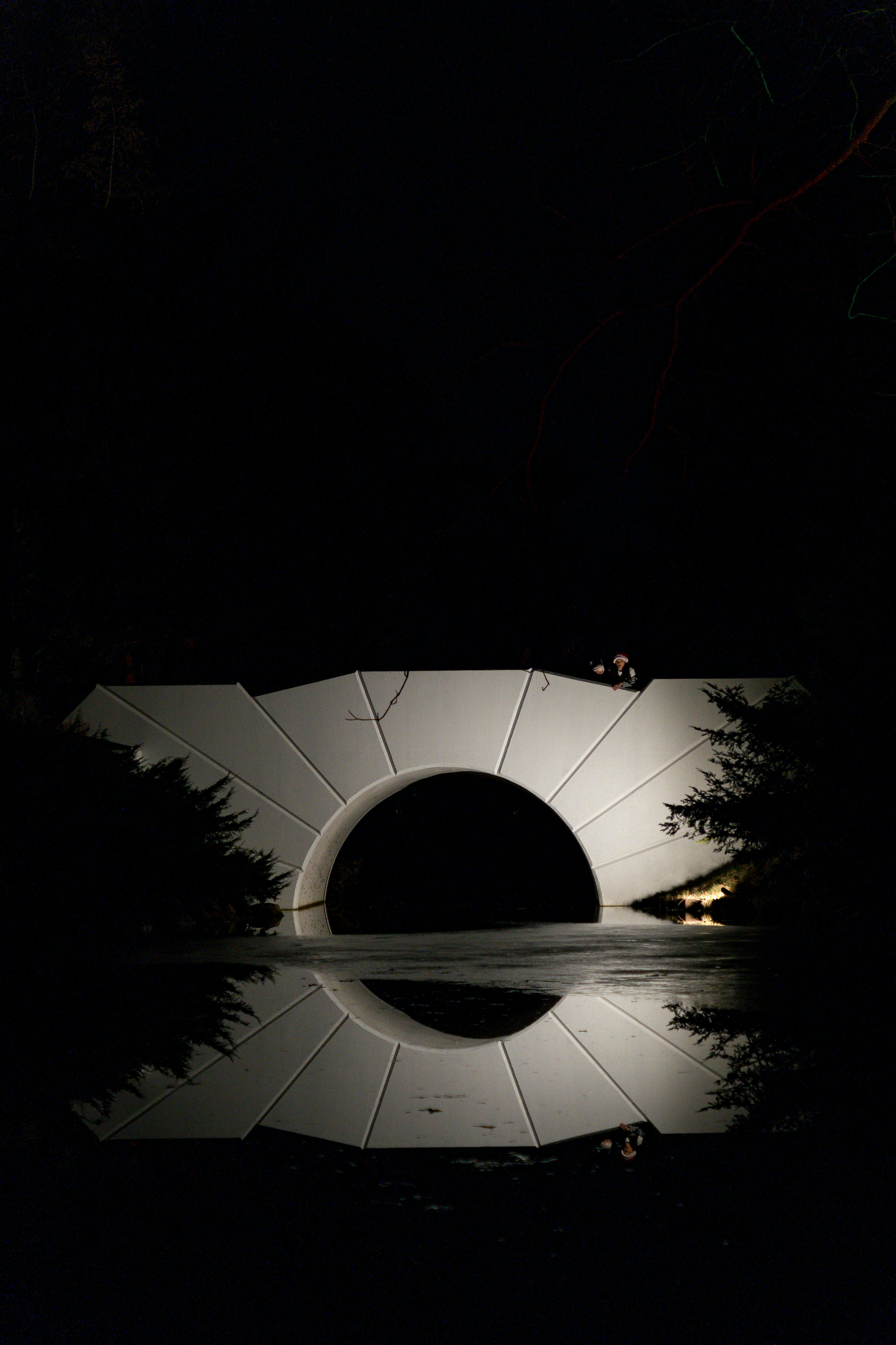 Night Gate Over Water: The Circular Arch and Its Dark Twin