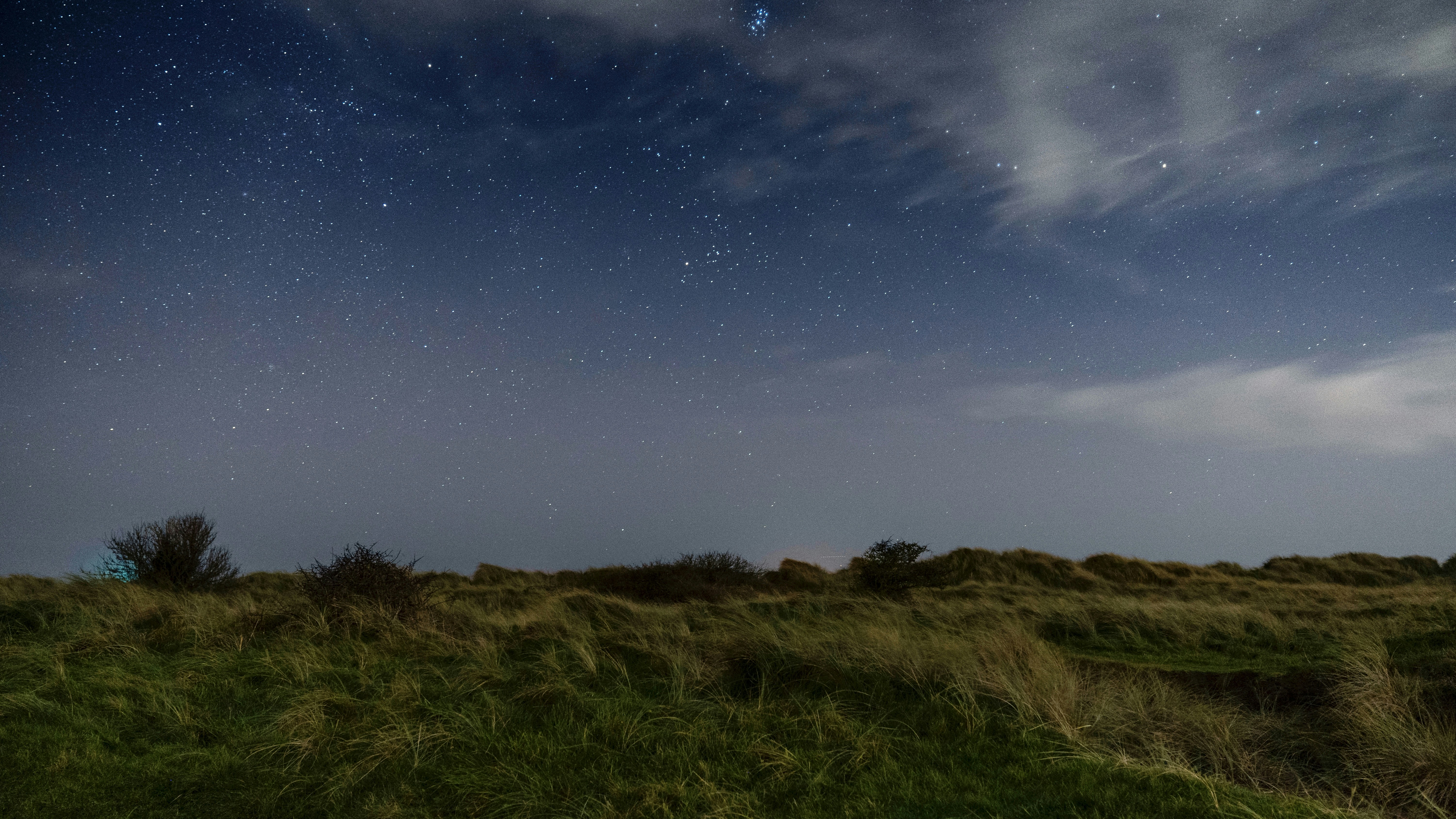 A grassy field under a night sky with stars photo – Free Ireland Image ...