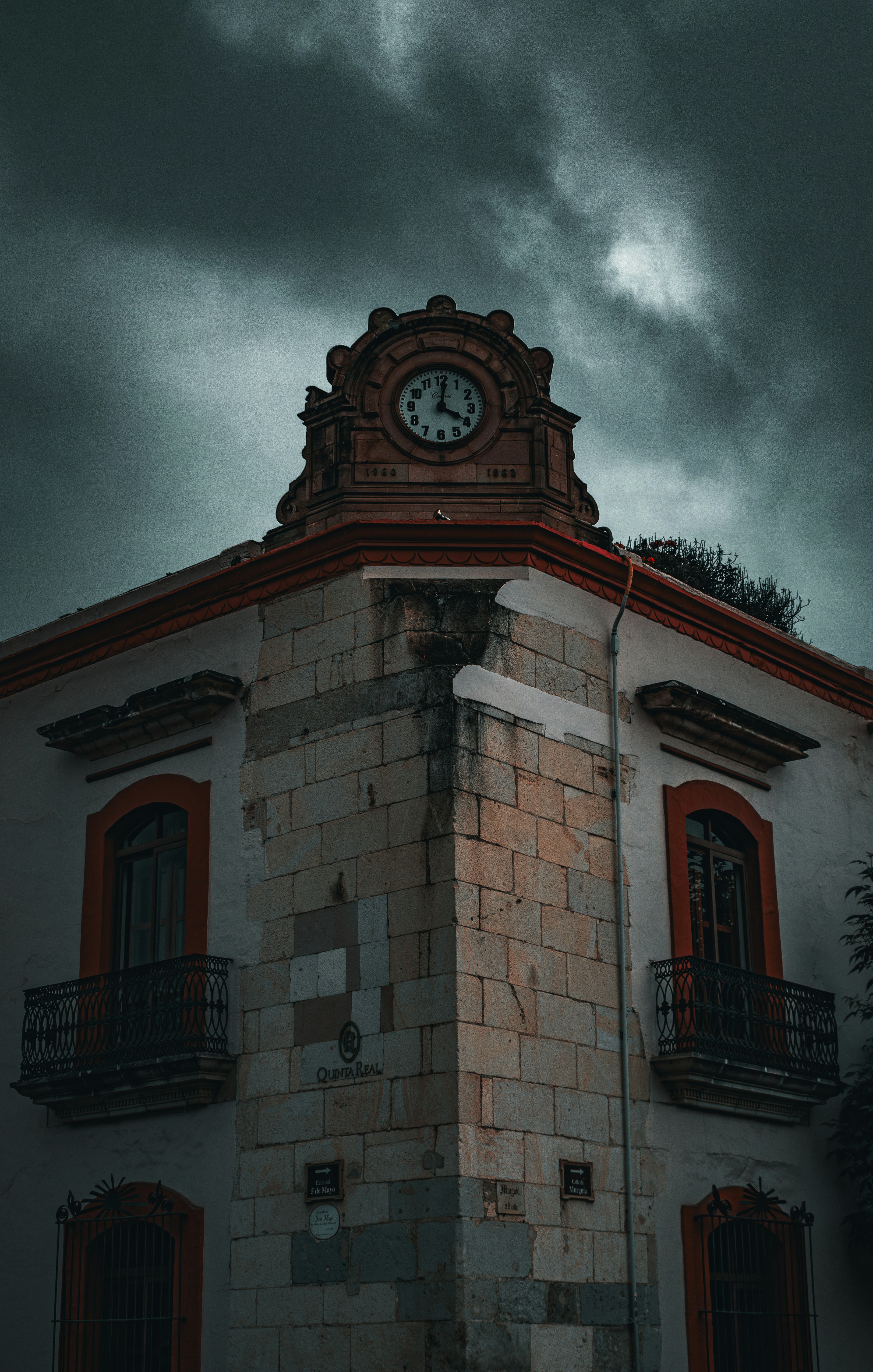 Clocktower Sentinel Under a Churning Sky