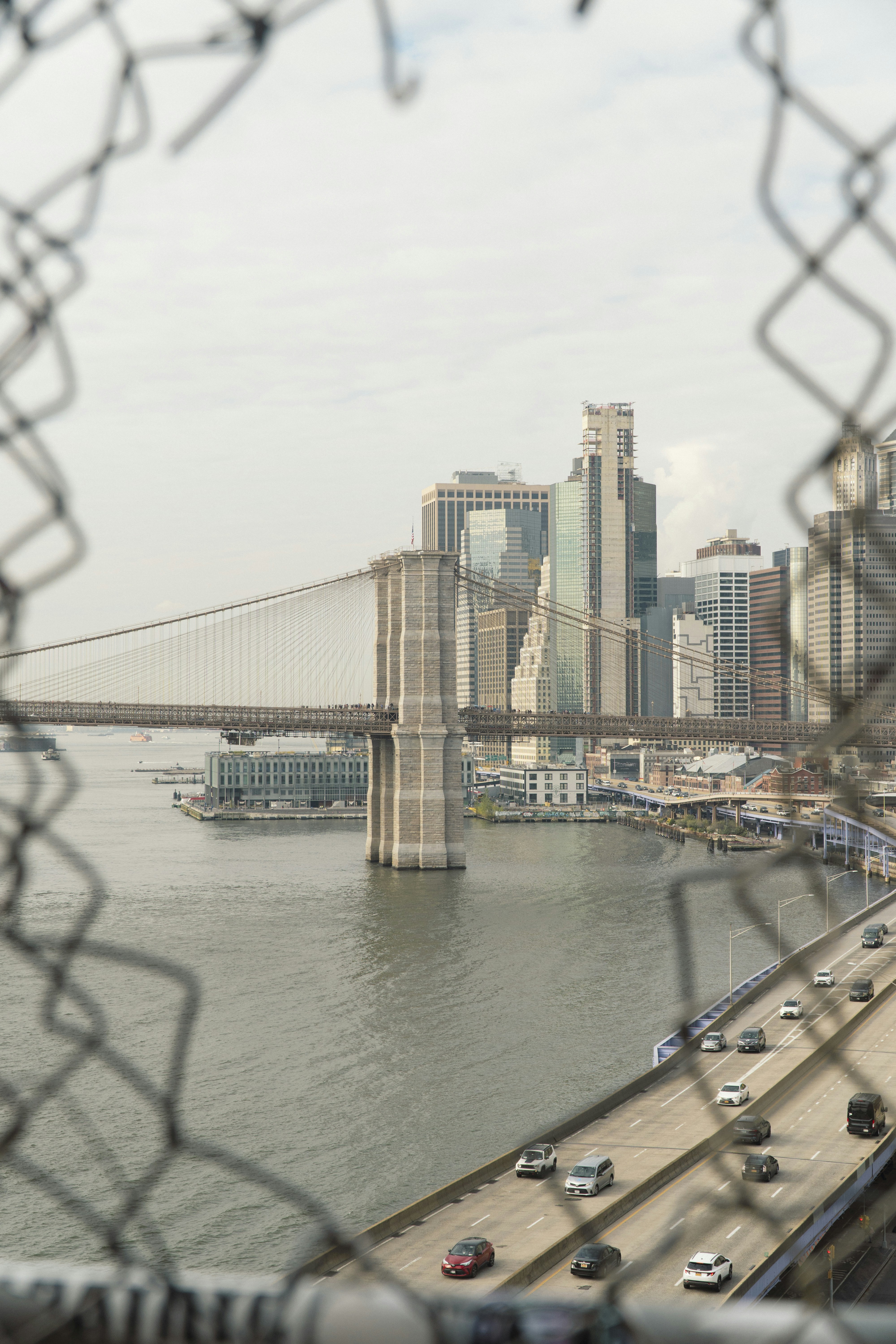 A view of a bridge over a body of water photo – Free Manhattan bridge ...