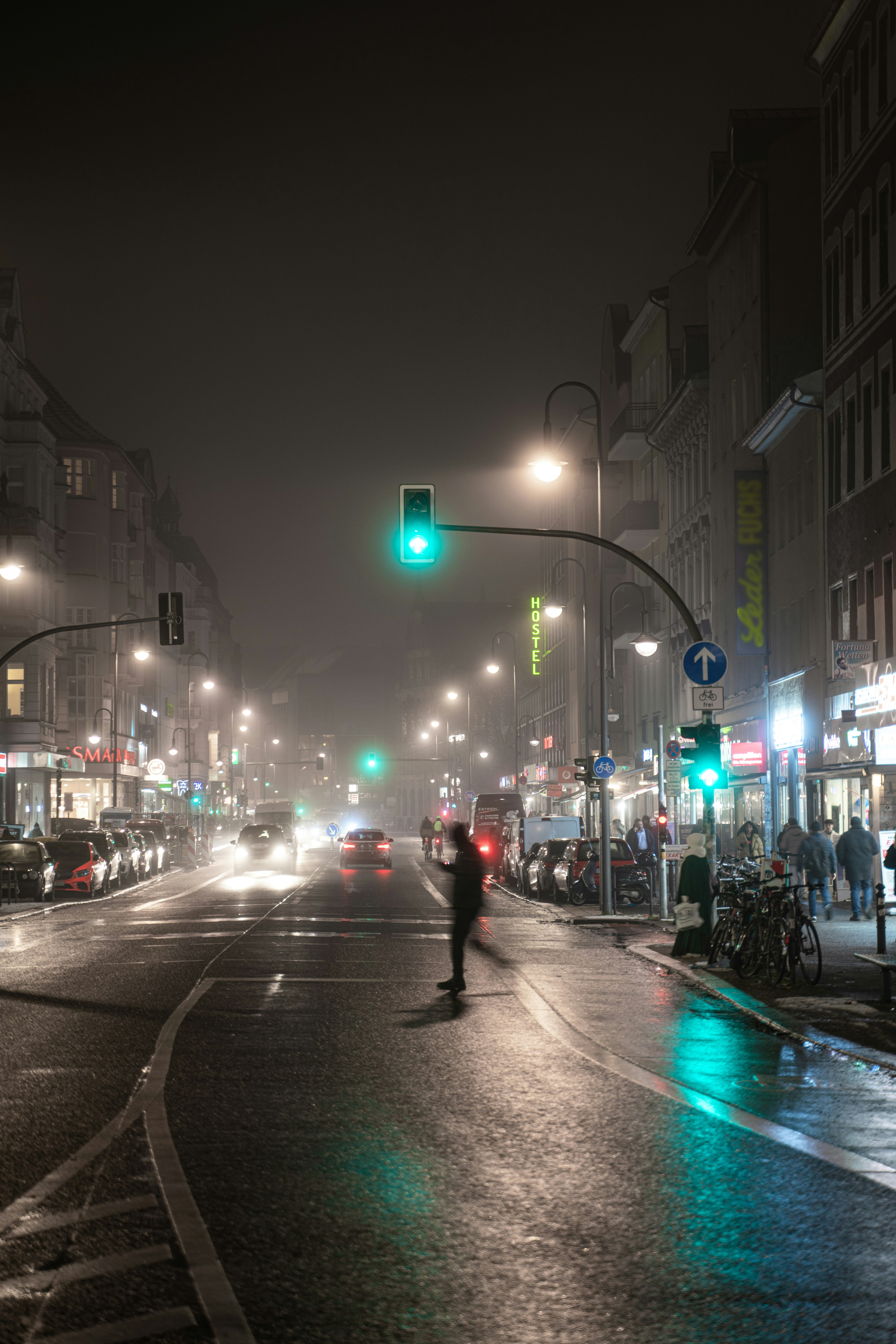 Neon Reflections & a Solitary Pedestrian: Night Street Cross