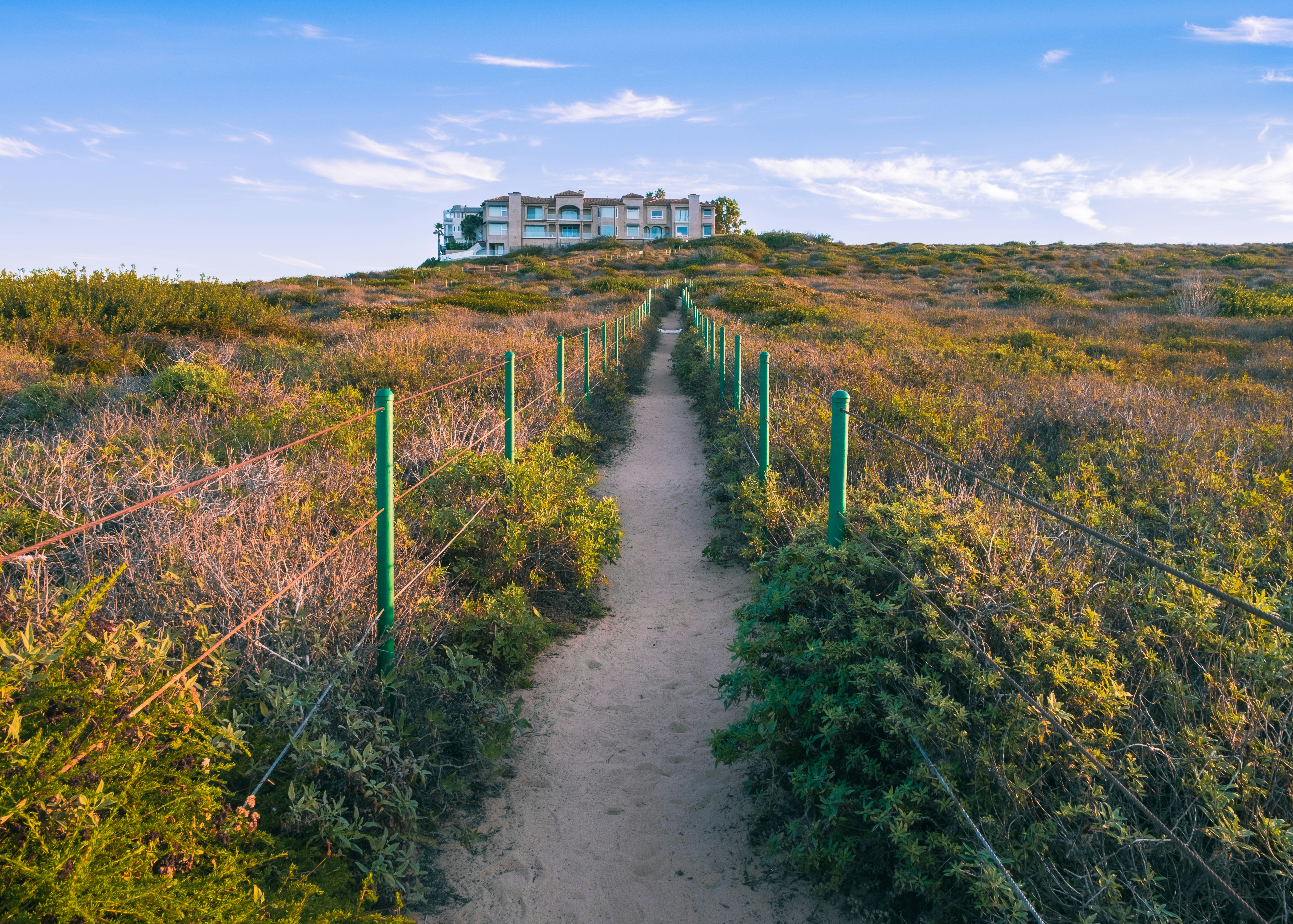 A house on top of a hill surrounded by bushes photo – Free Dana point ...