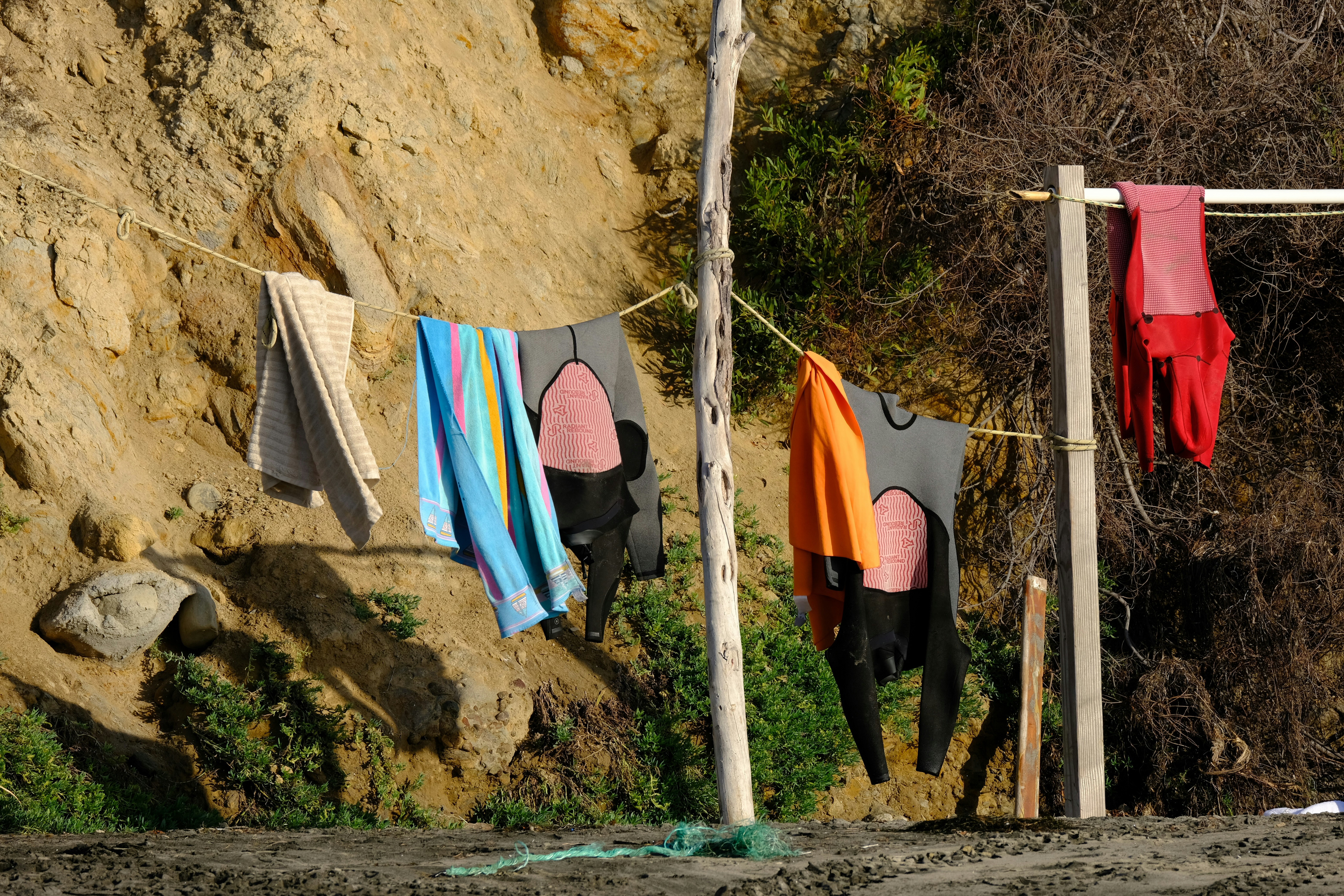 Cliffside Clothesline: Color on a Wind-Scoured Shore
