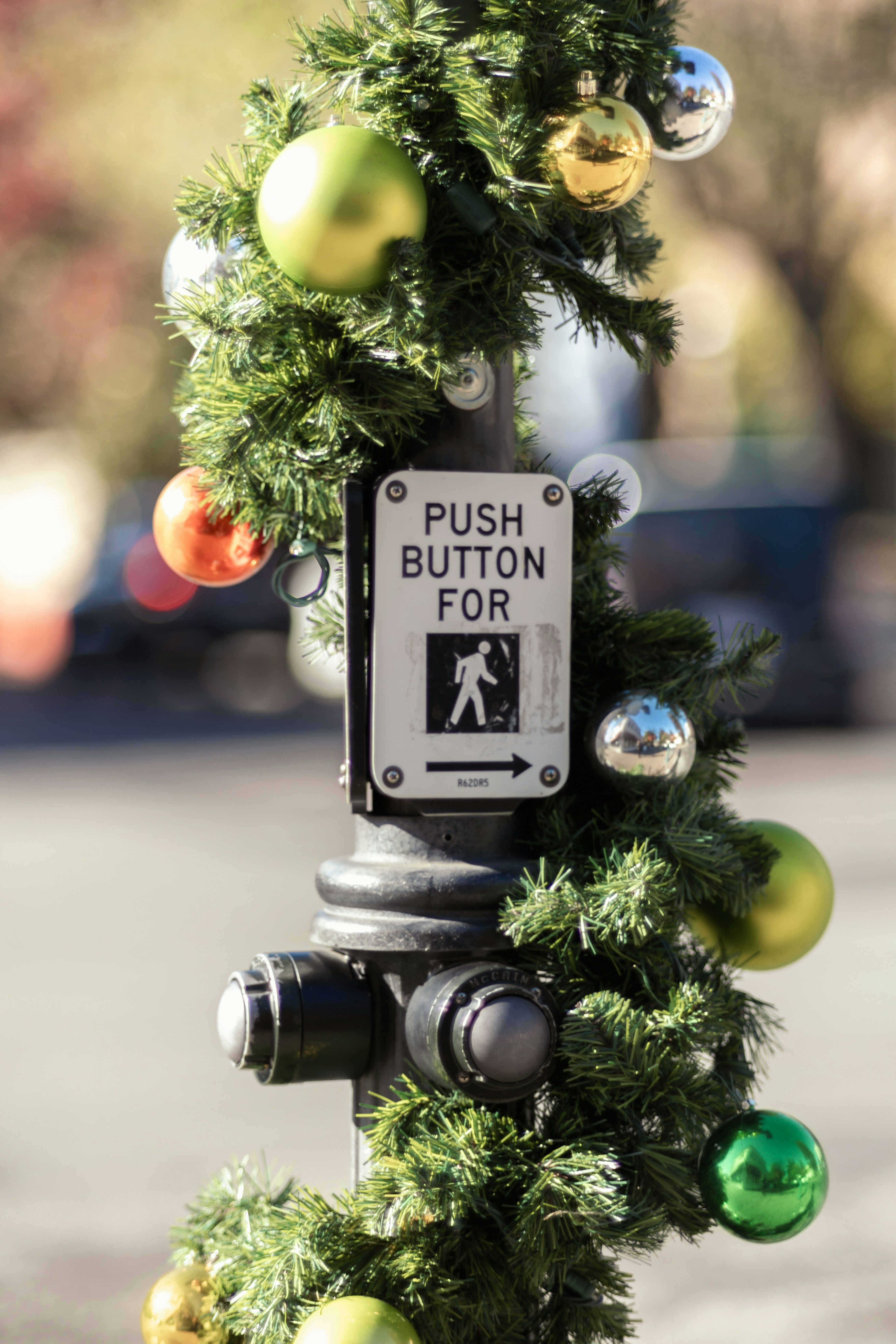 Lift-Button Halo: A Festive Fire-Exit Post Decor